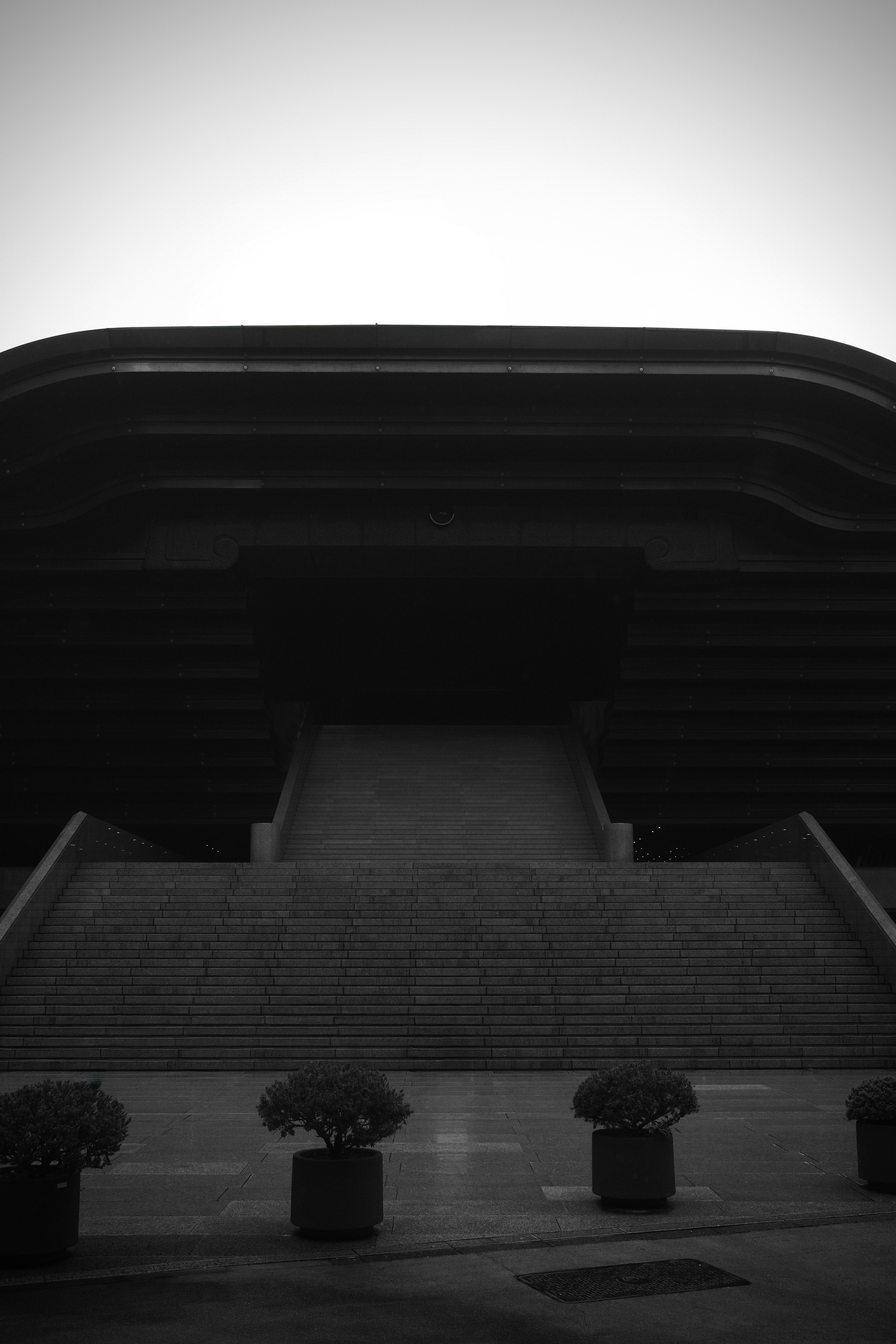 Monumental Stairway into Shadowed Horizon