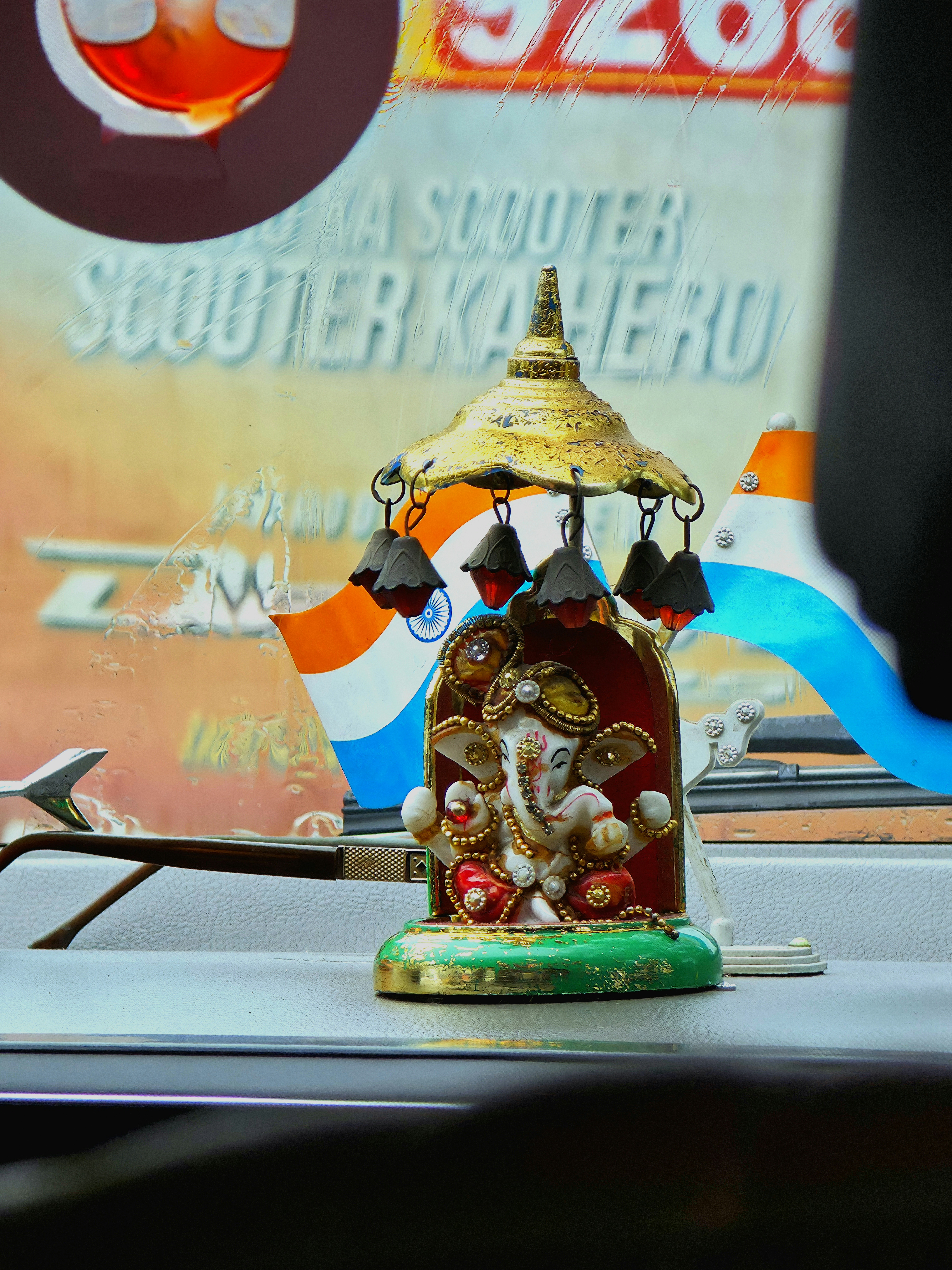 Tiny Shrine on the Dashboard: A Blessed Ornaments Keeps Company with the Road