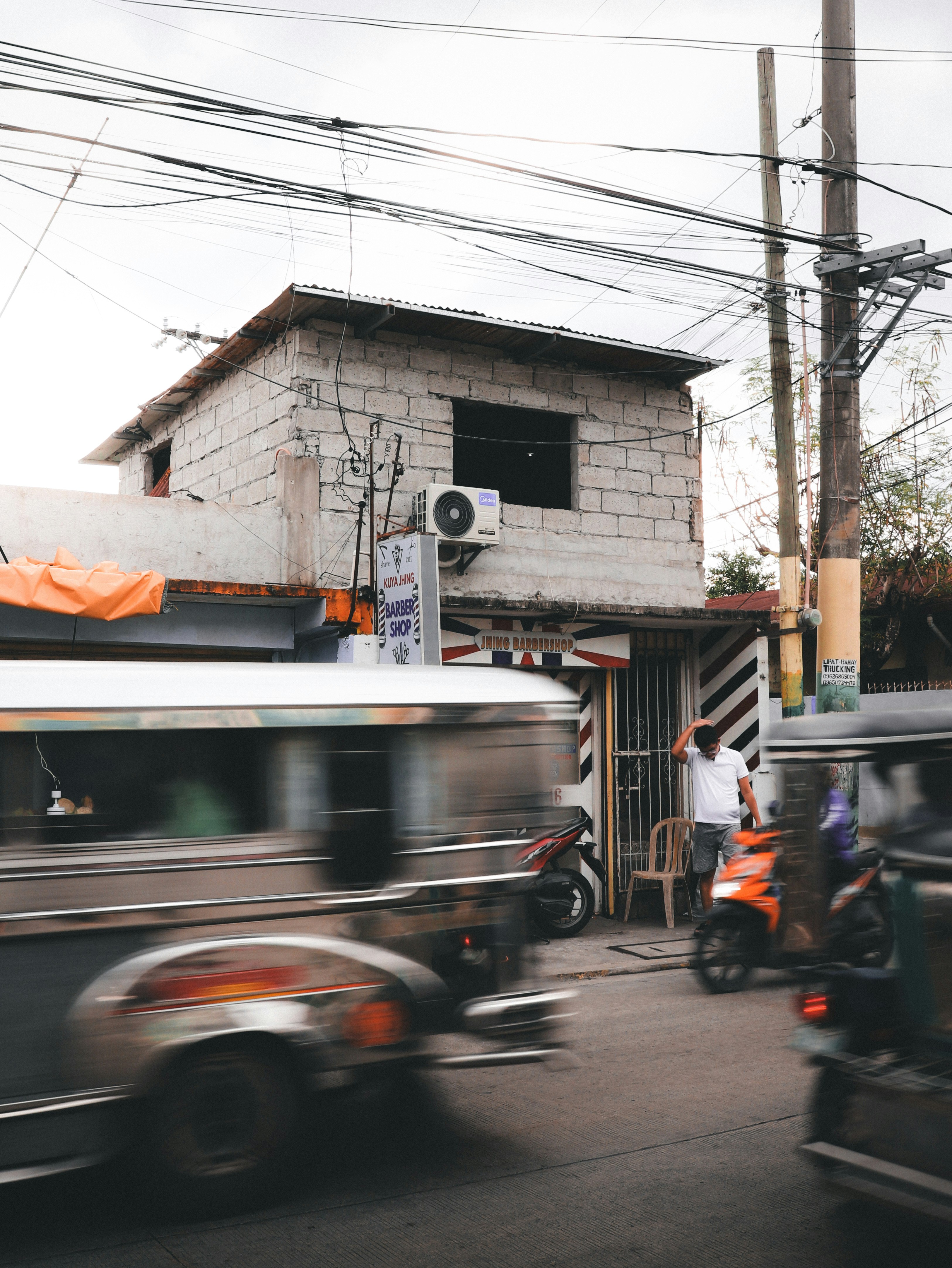 Bustling Street Edge: A Motion-Bleached Afternoon