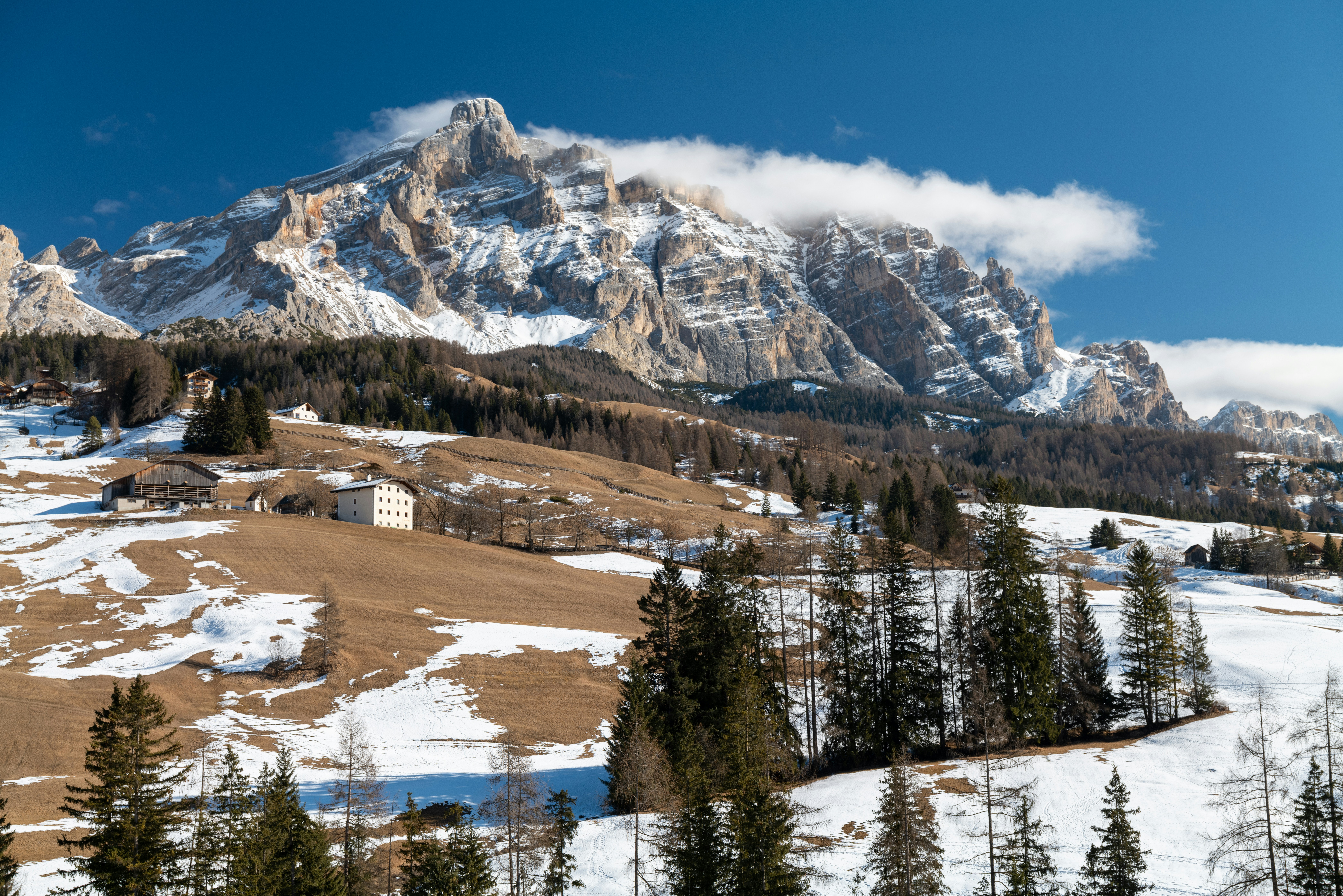 Snowfields at the Foot of a Jagged Alpine Peak