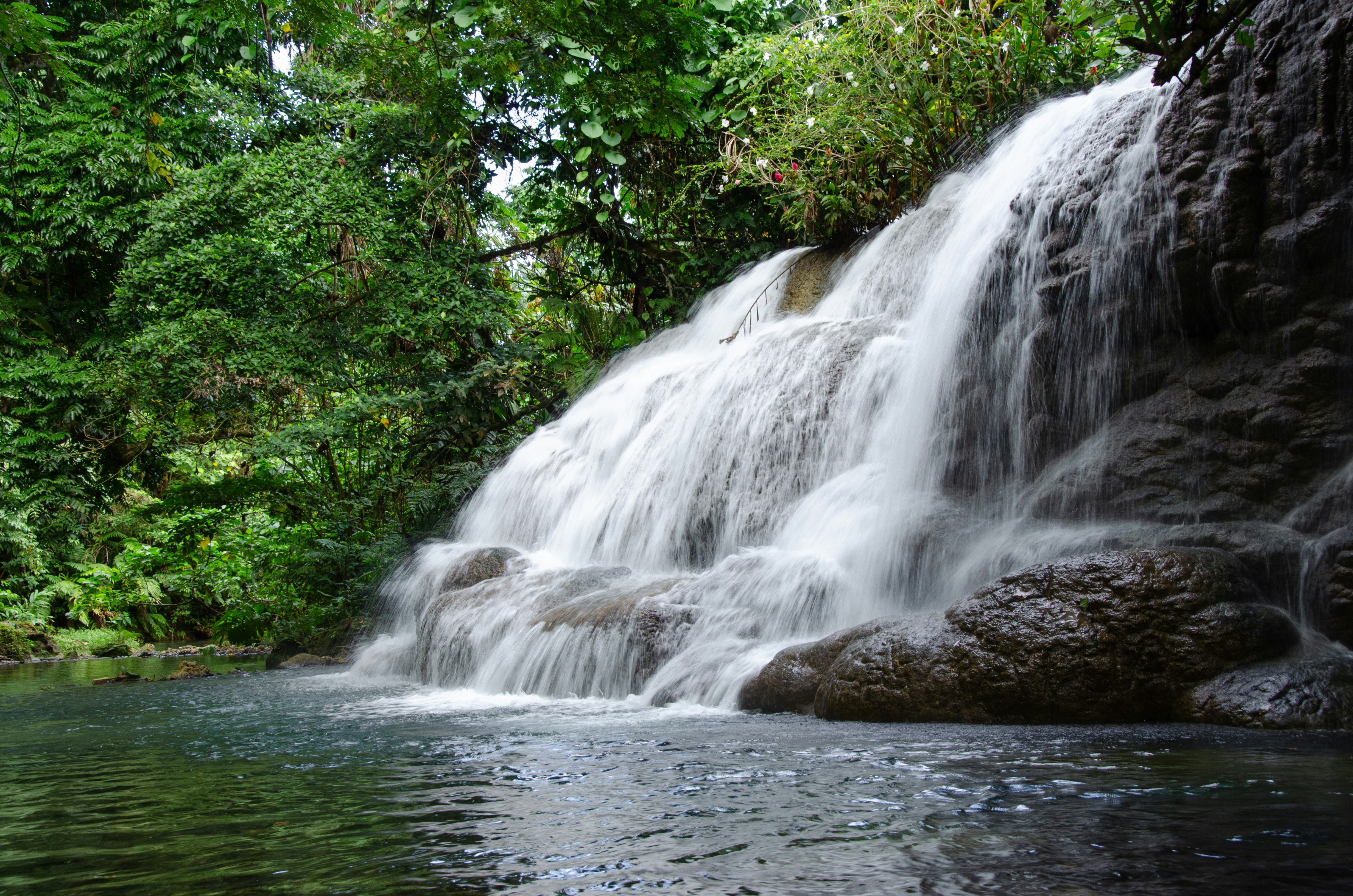 Whispering Cascade in a Green Bend
