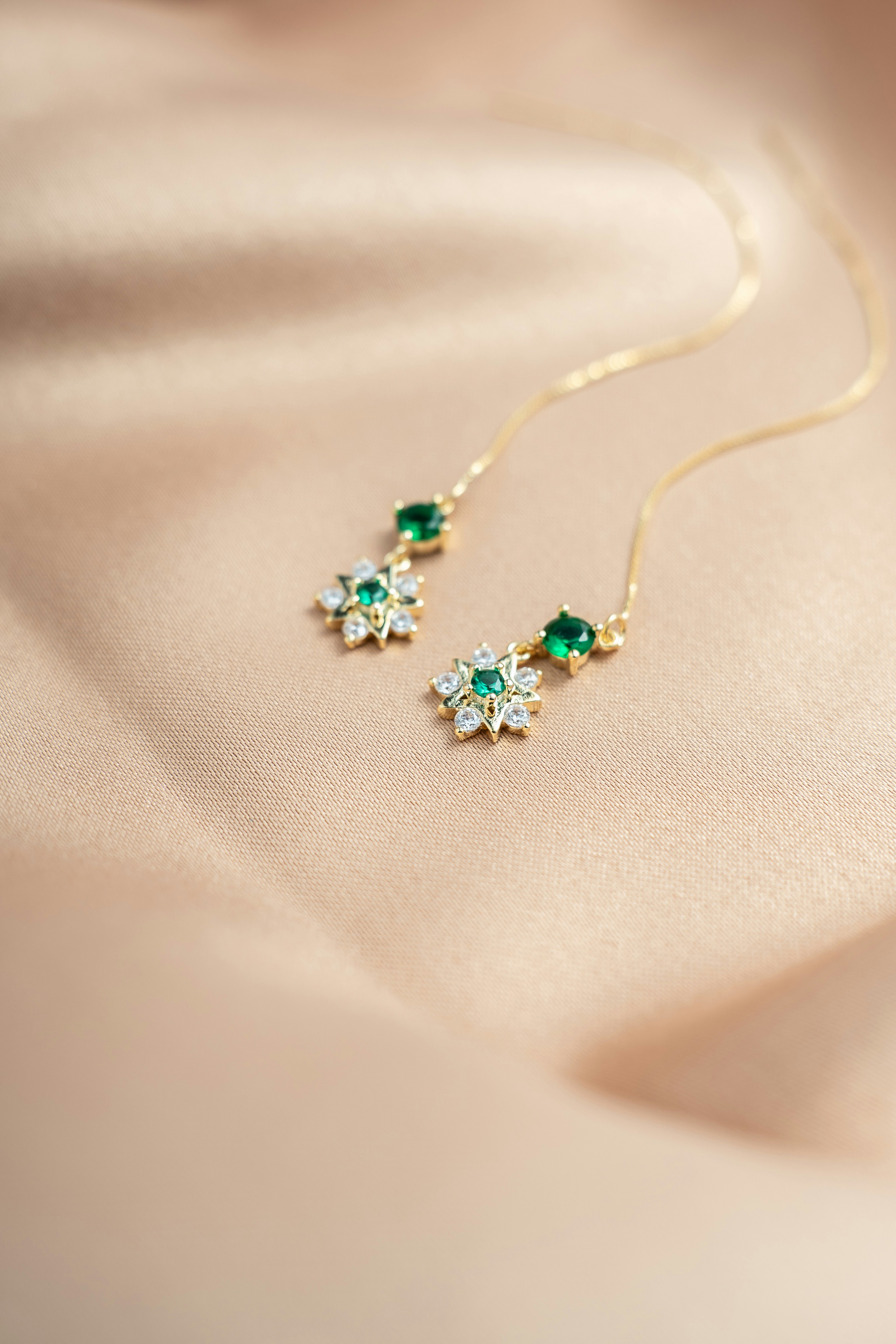 Emerald-and-Crystal Drops on Satin Gold