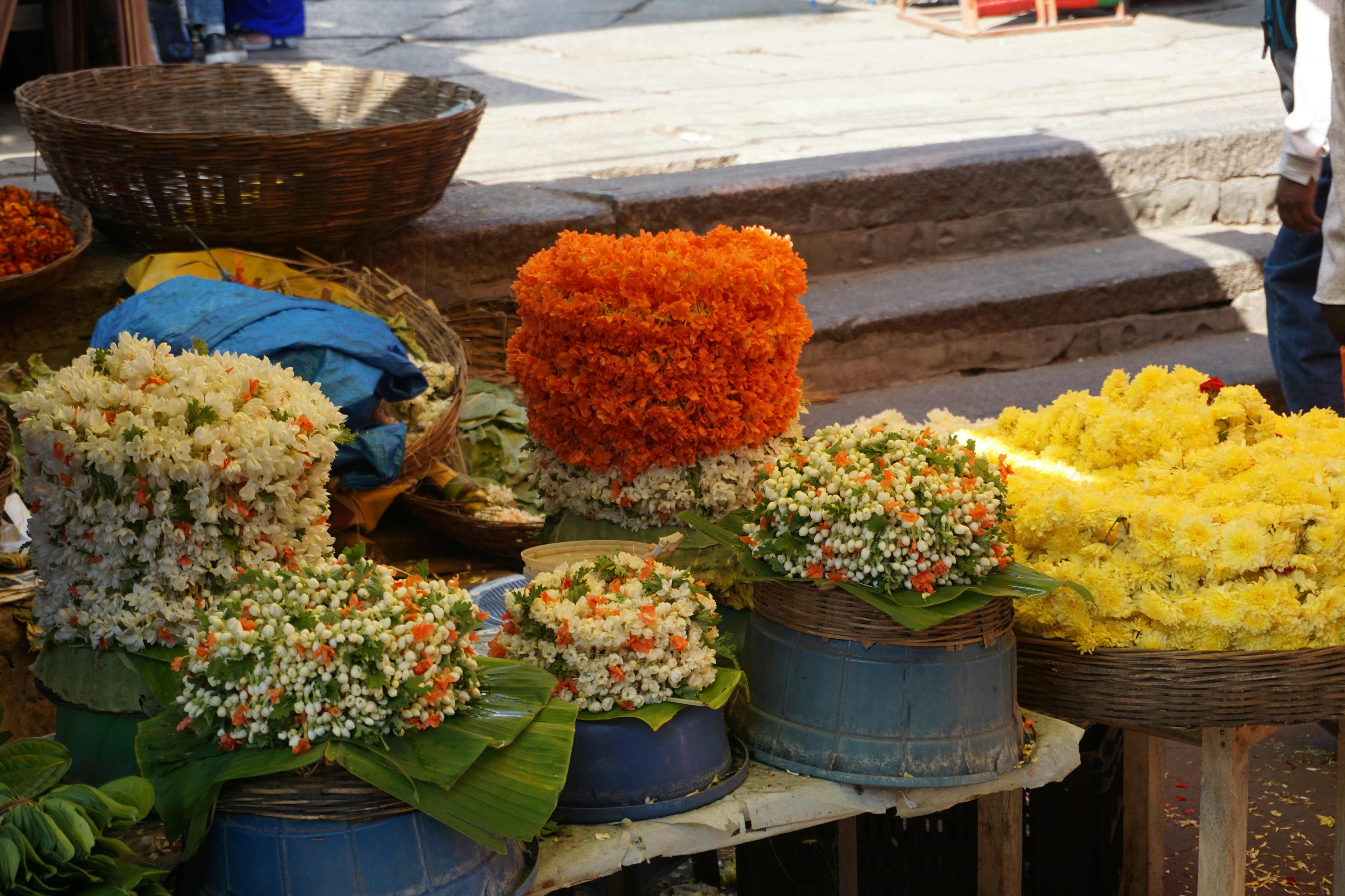 Vibrant Altar of Petals: A Market Stall of Marigold and Chrysanthemum Bouquets
