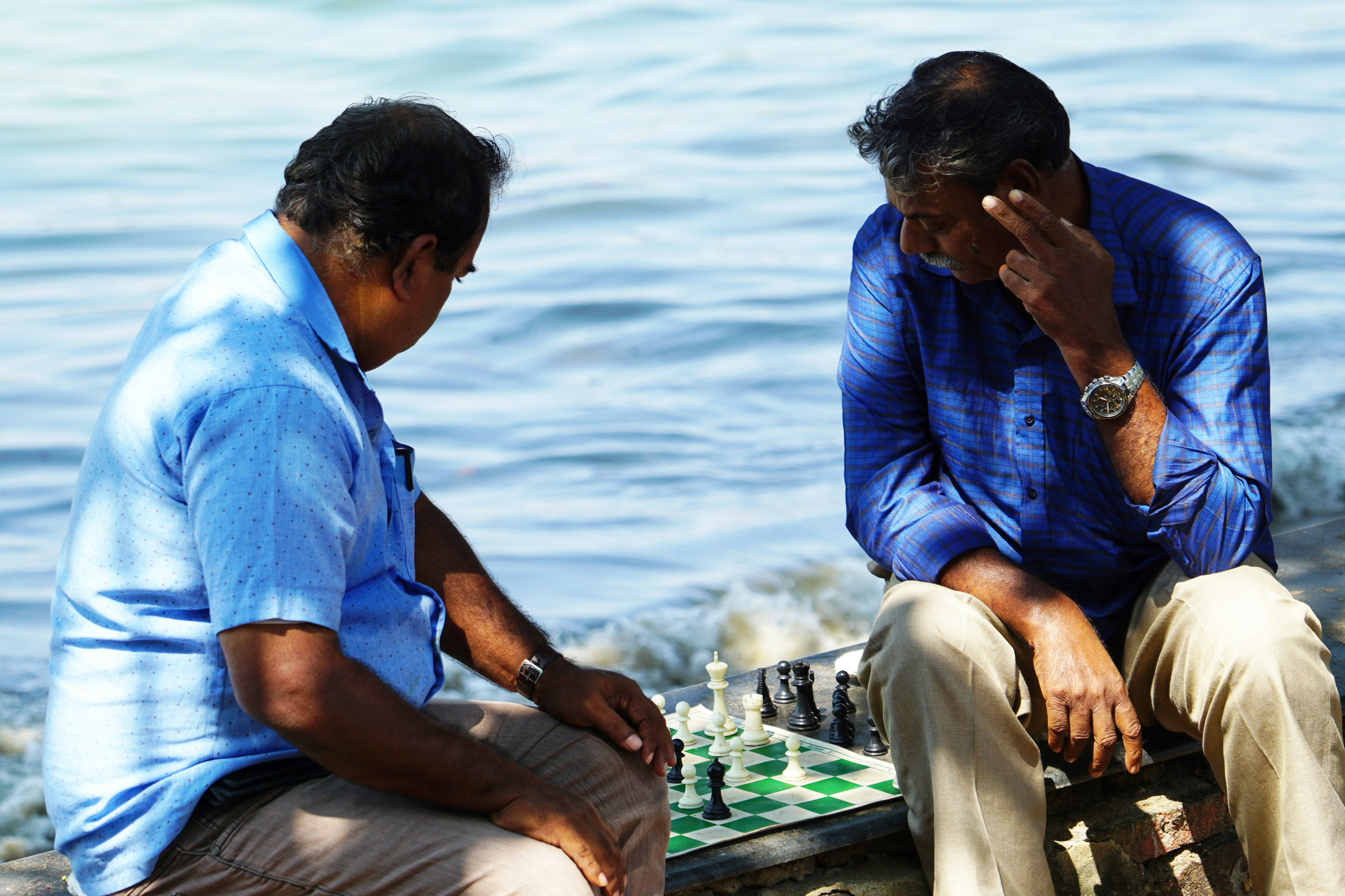 Quiet Strategy by the Water: A Chess Match on the Shore