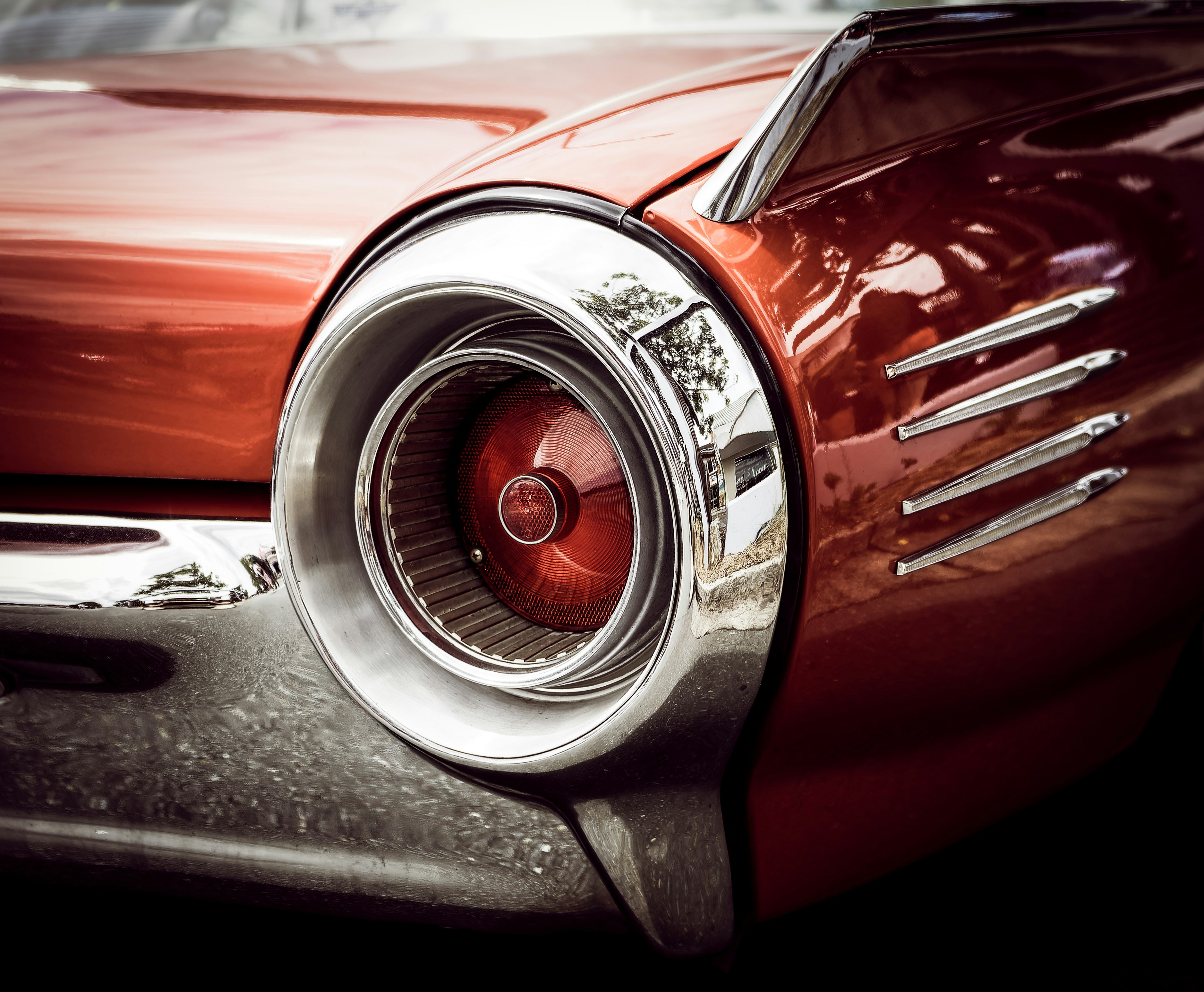Chrome Lens and Crimson Tailfin: A Close Encounter with a Classic