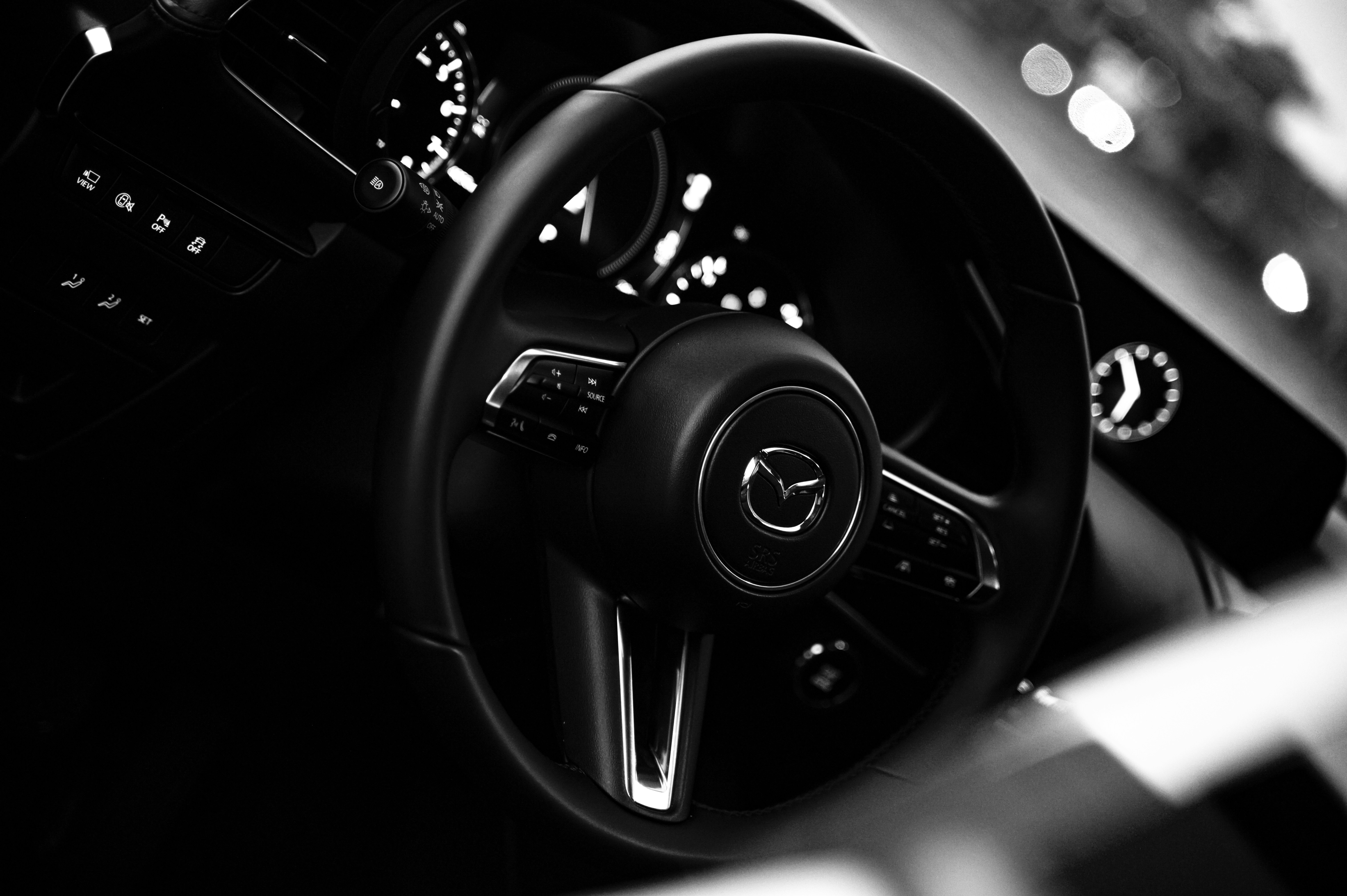 Centered Steel: The Mazda Steering Wheel in Low Light