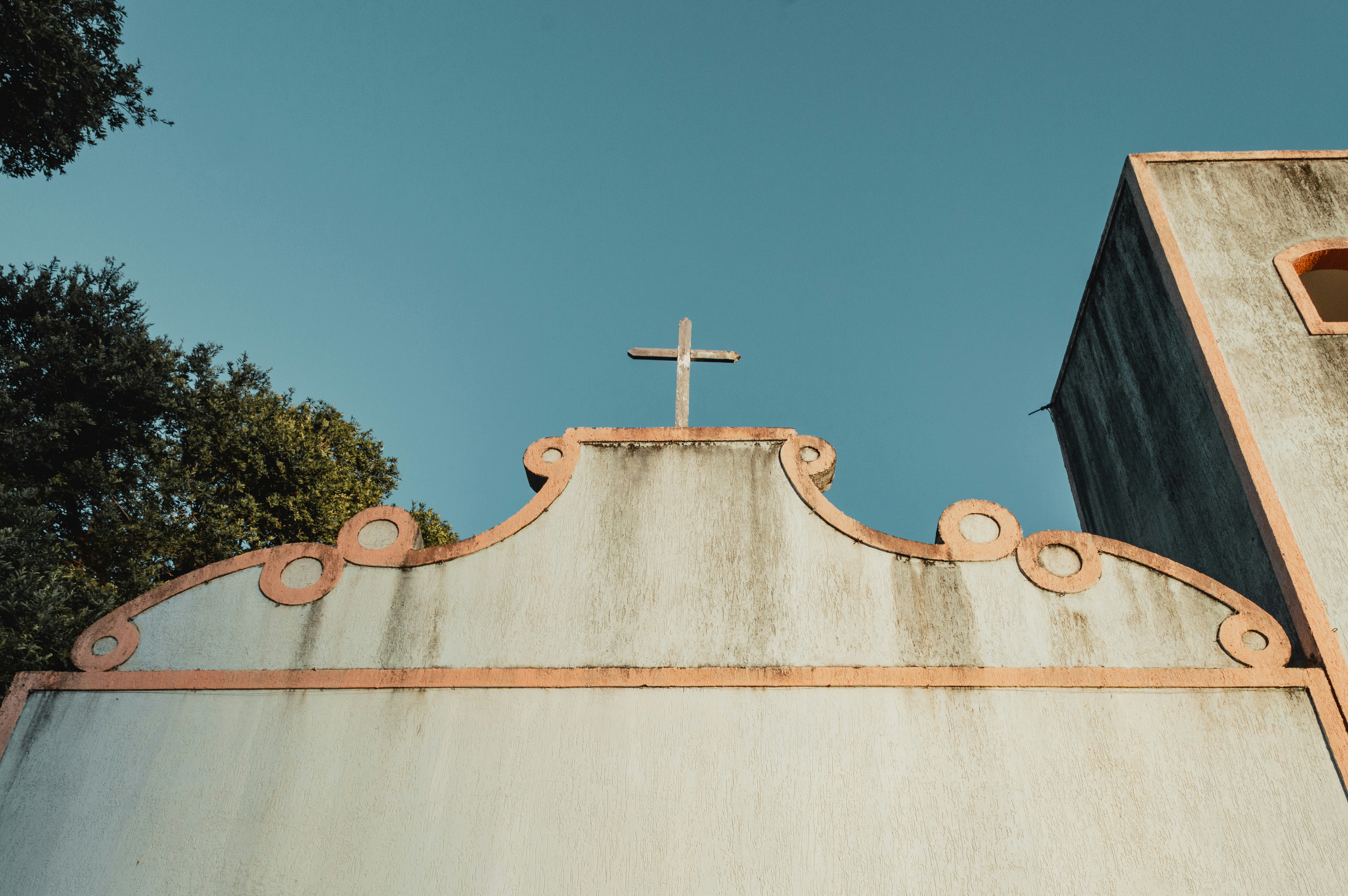 Cross Above the Nostalgic Façade