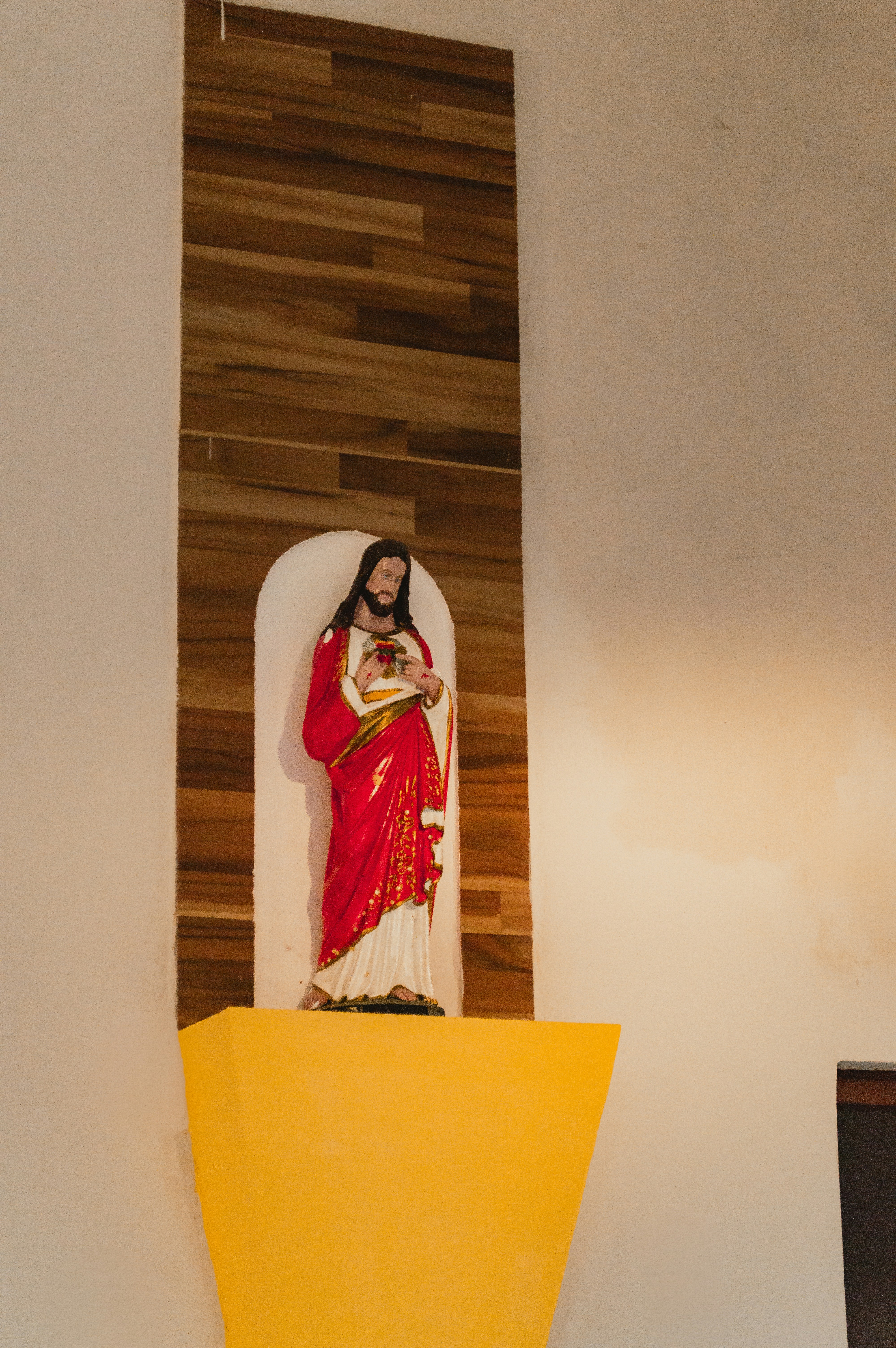 Statue of Jesus in a Modern Chapel Niche