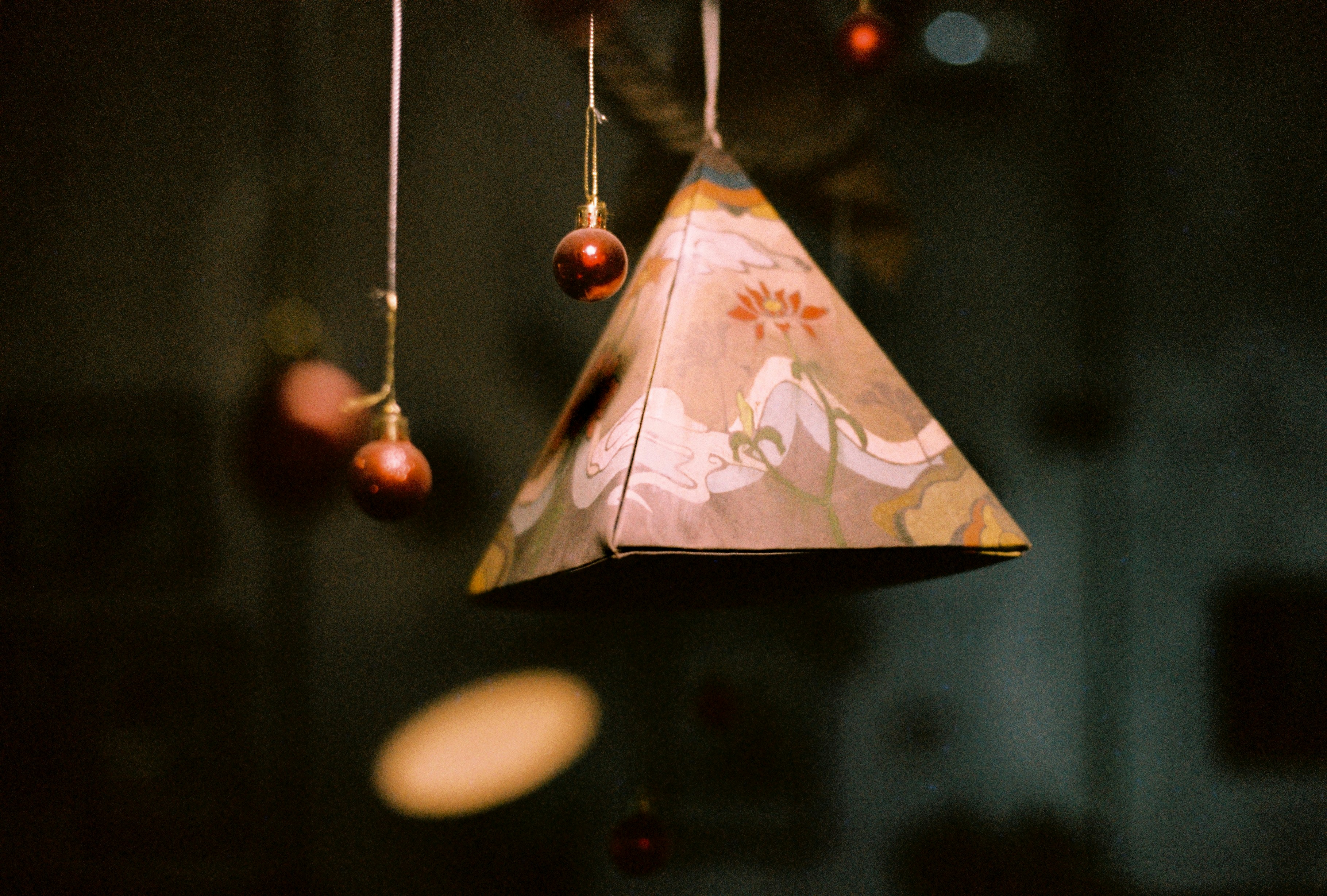 Hanging Paper Ornament in Softly Lit Room