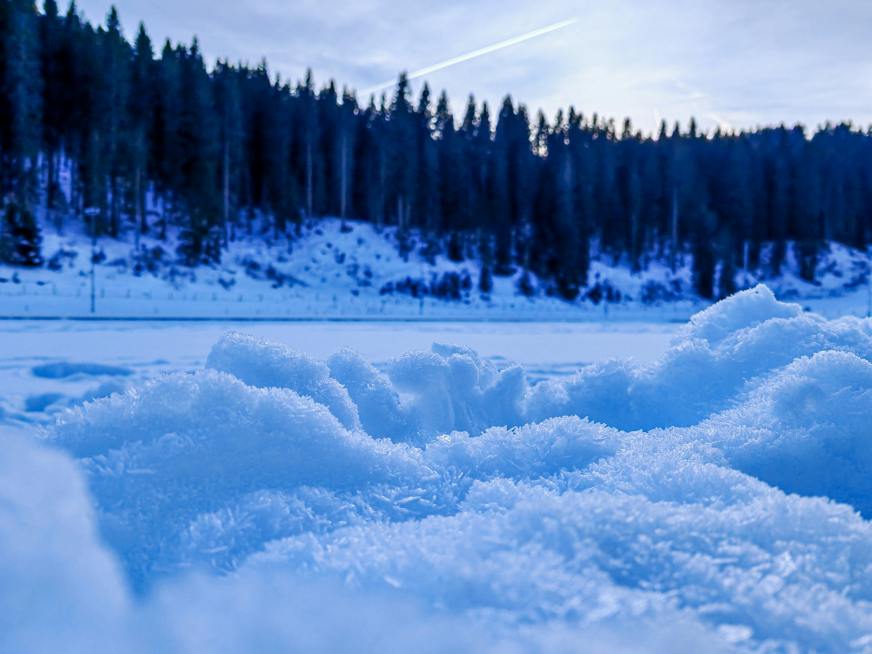 Snowfield Horizon Under a Midnight Blue Sky