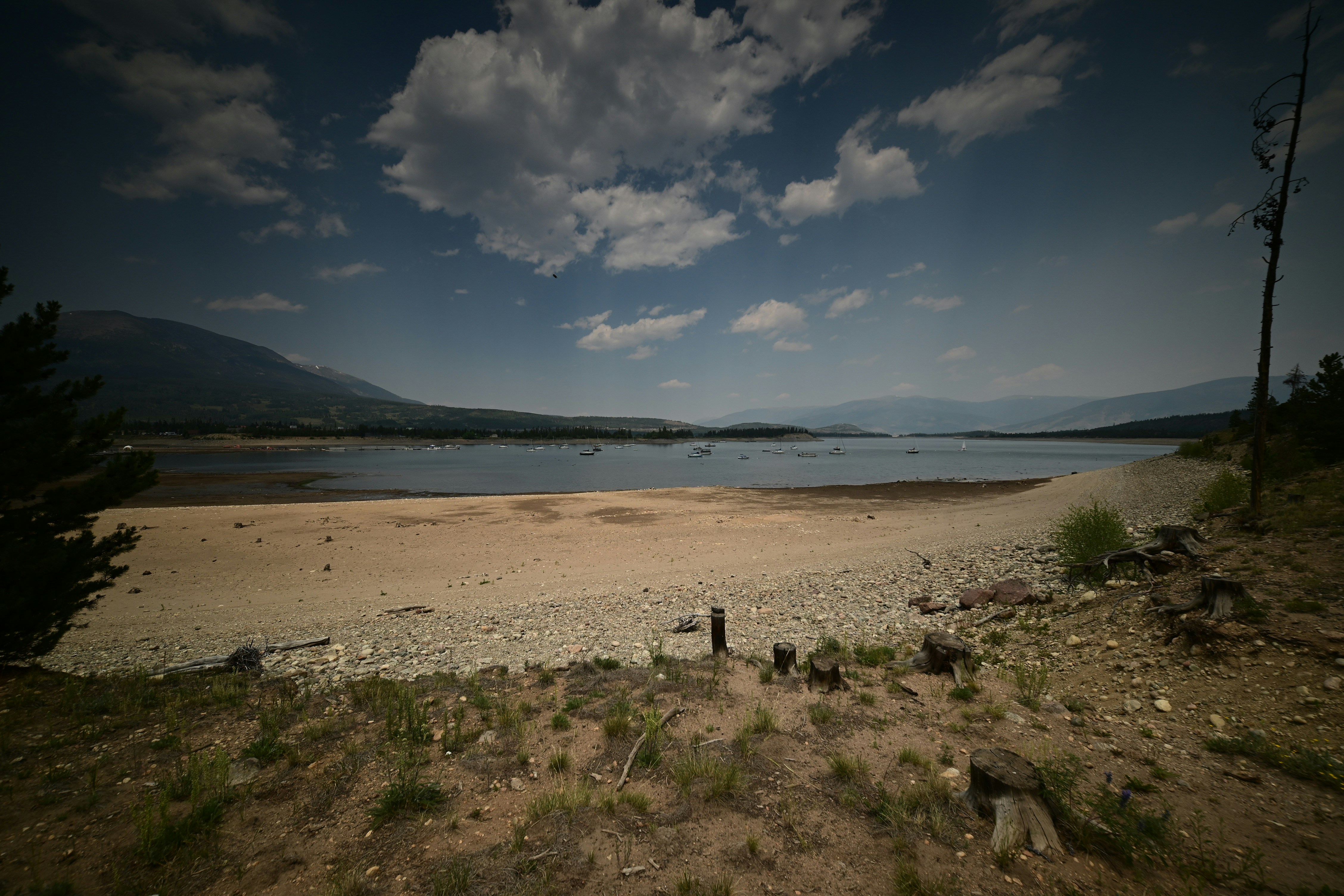 Shoreline Serenade at Distant Mountains