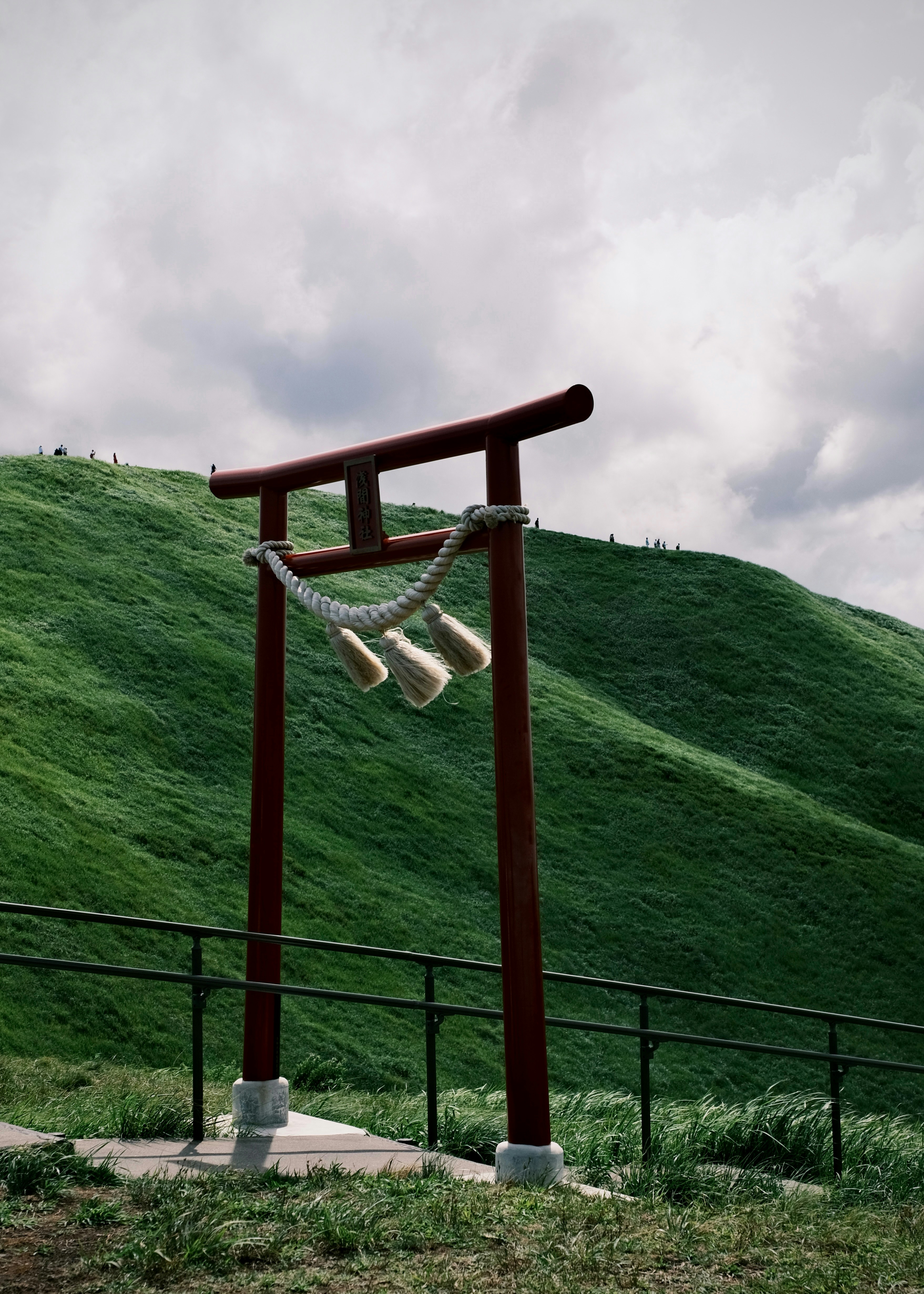 Sacred Gatekeeper Overlooking Rolling Emerald Hills