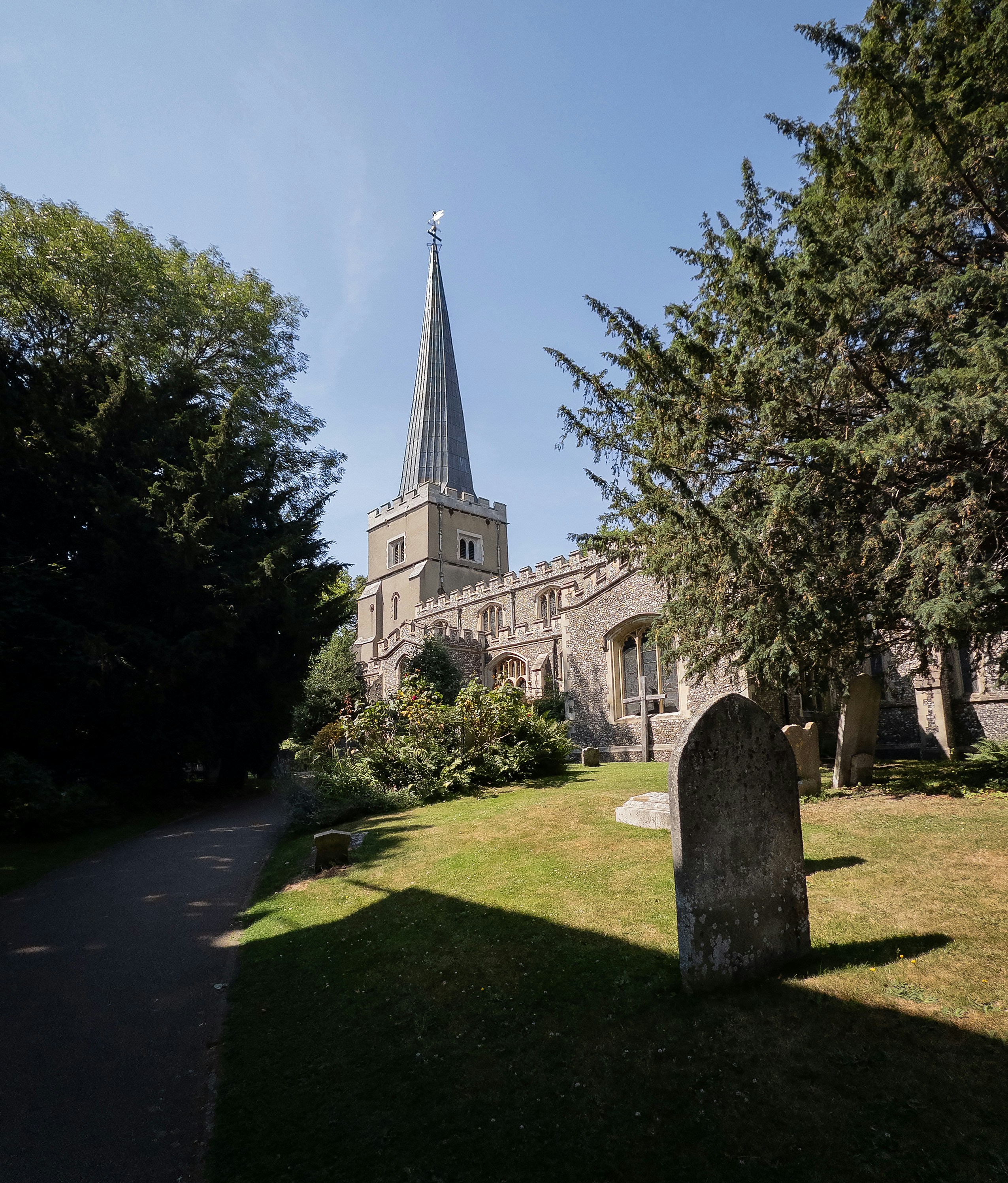 St. Spire Overlooking the Quiet Churchyard
