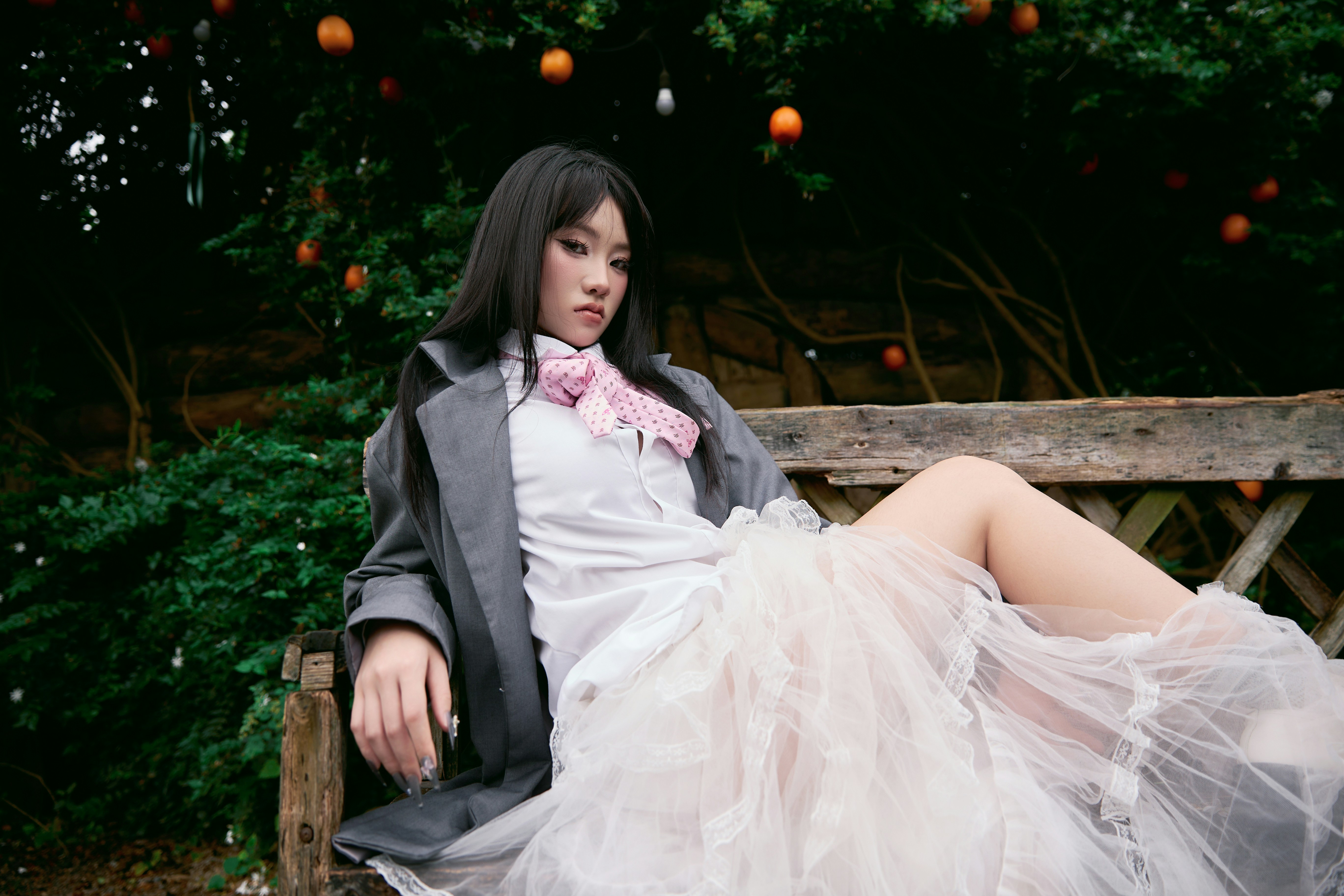 Serene Portrait on a Citrus-Leaf Terrace