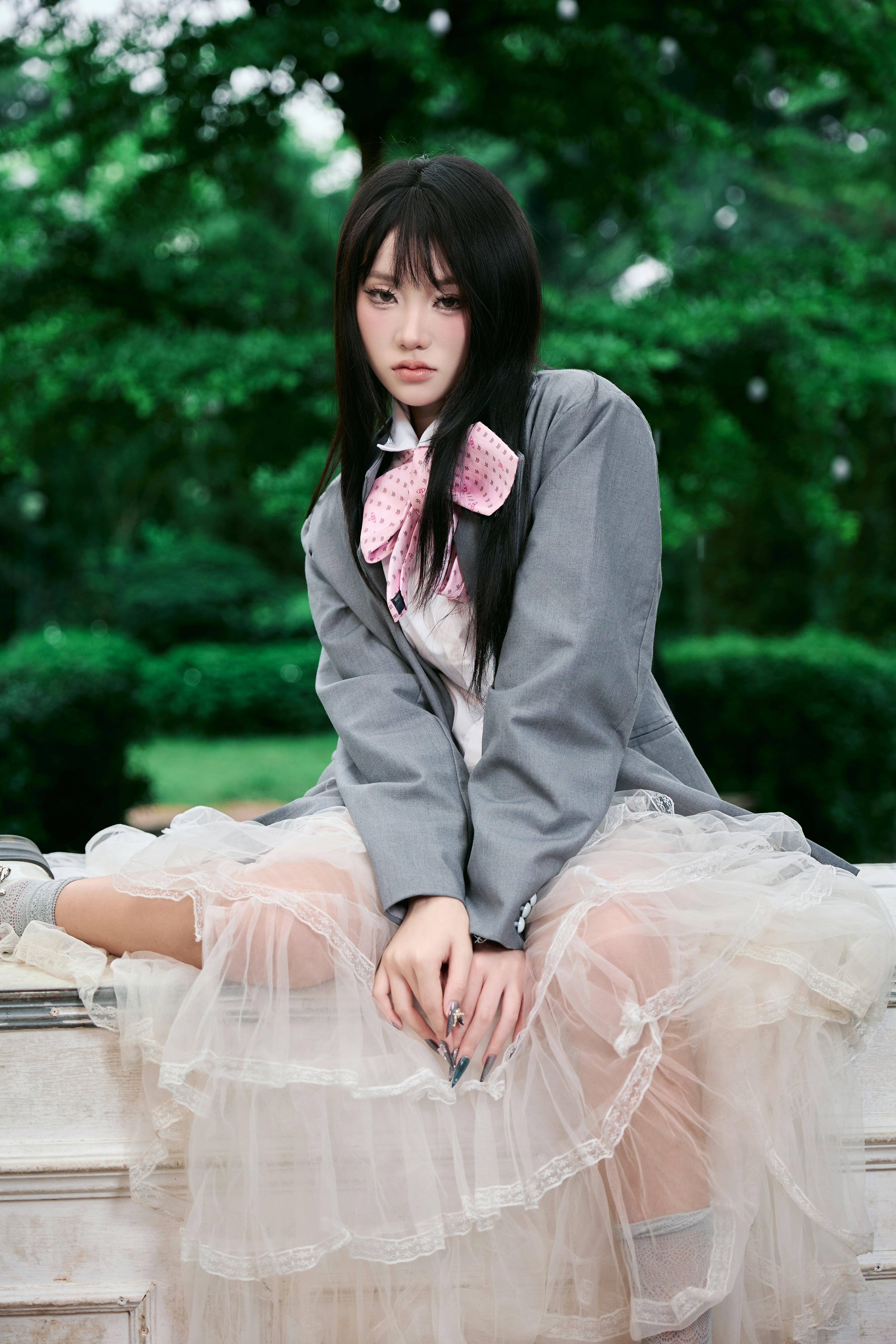 Quiet Portrait in a Garden: Girl in Soft Grey and Tulle