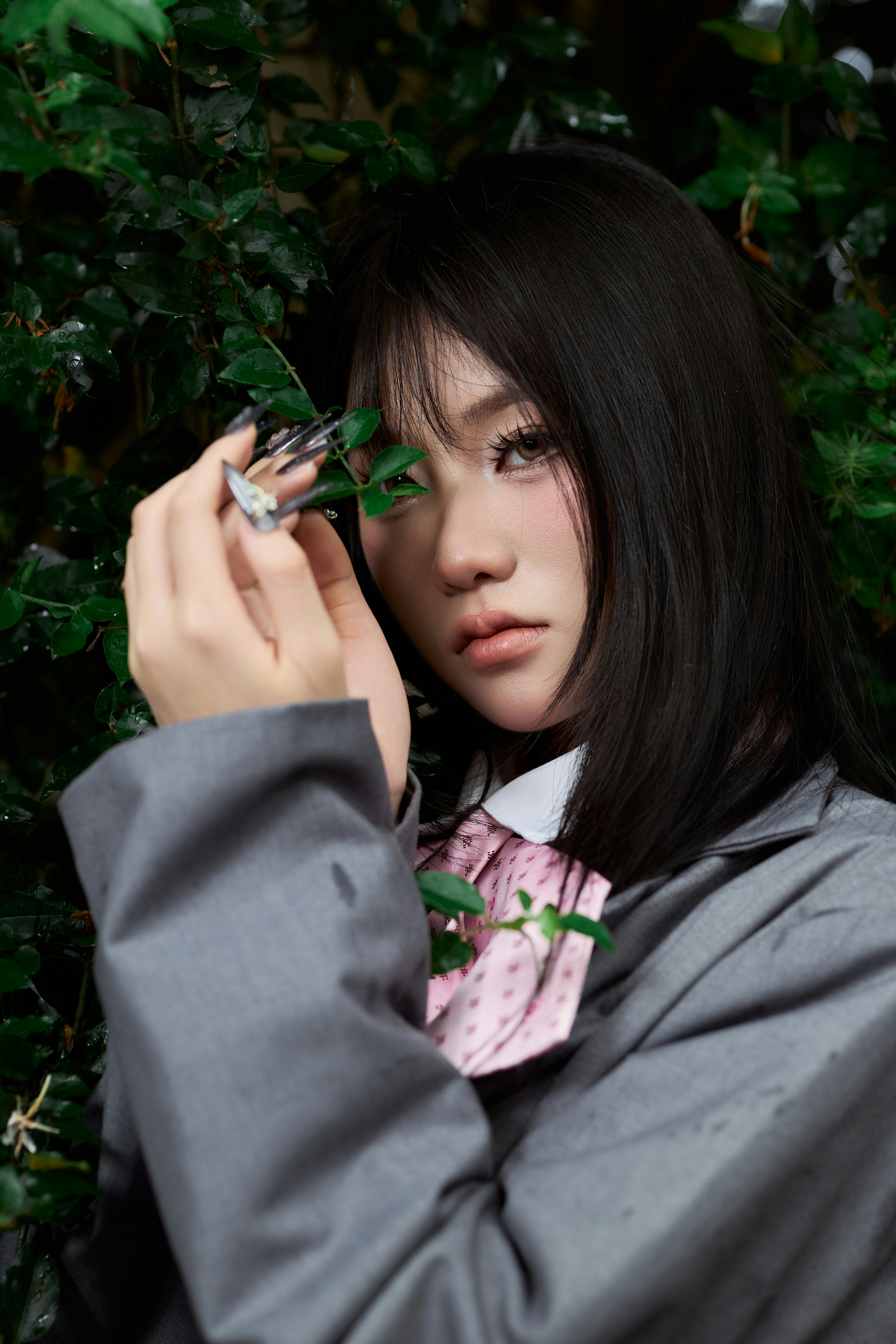Veiled Gaze Among Dark Foliage