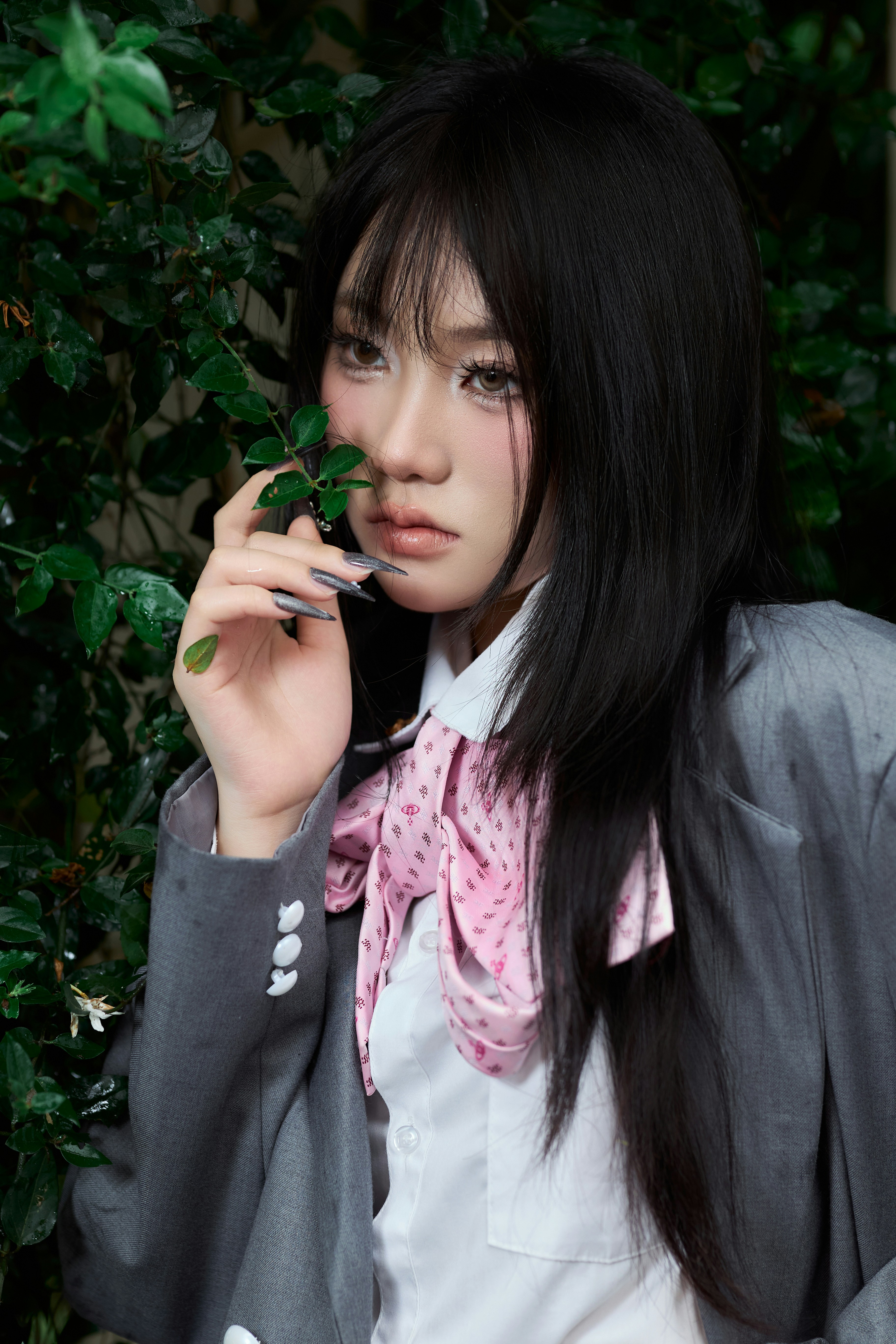 Quiet Gaze Through Dark Hair