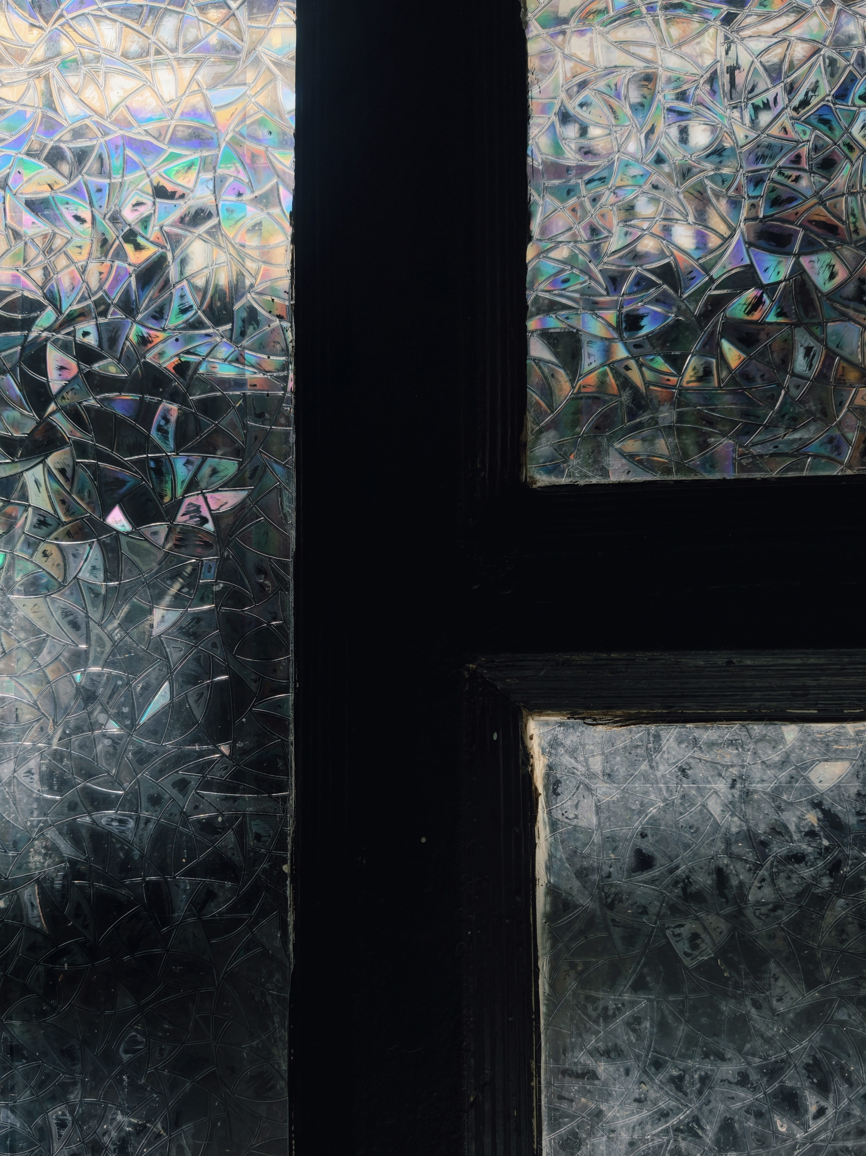 Chromatic Glass Window: Fractured Light through a Dark Frame