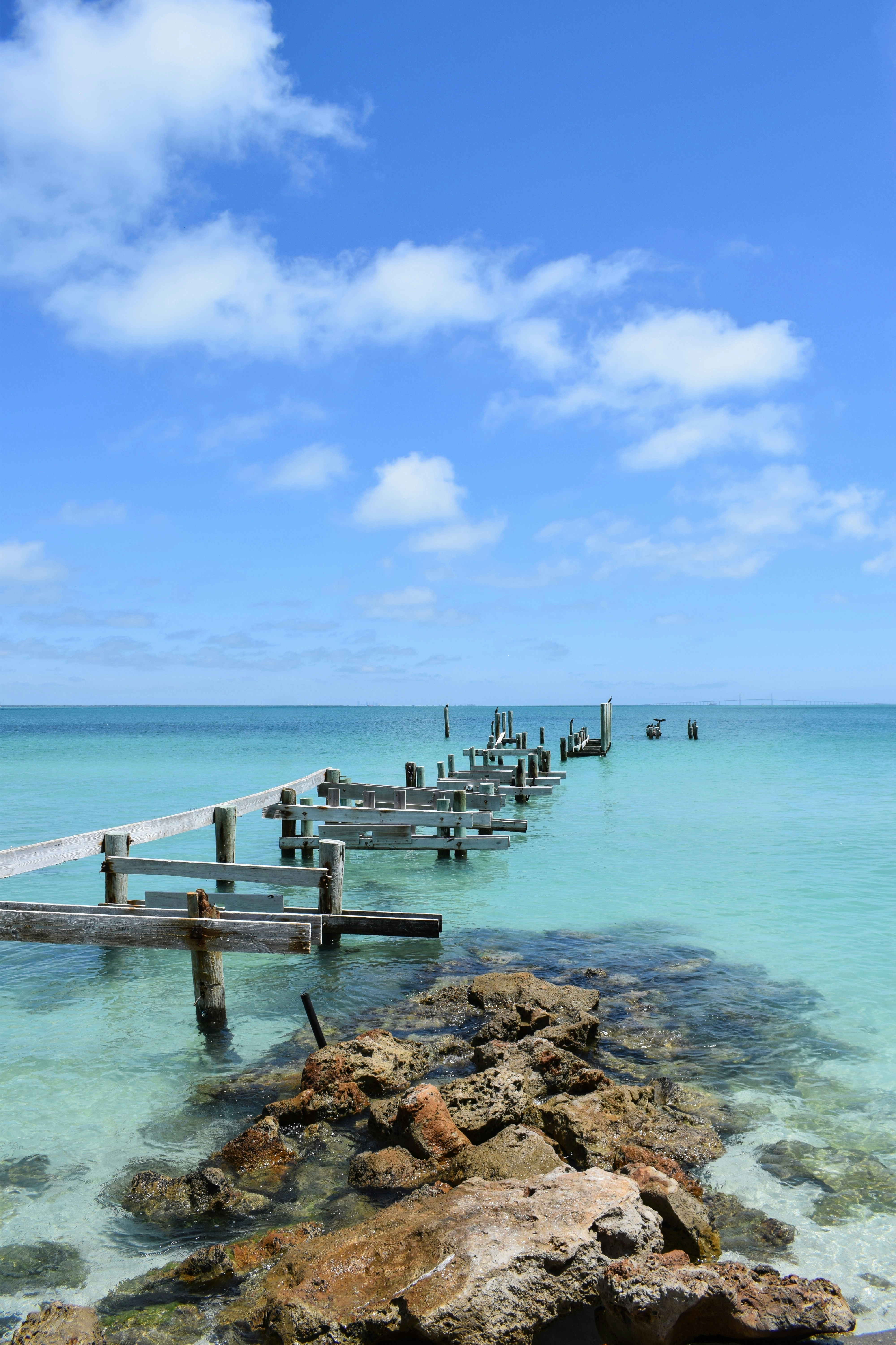 Jetty to the Horizon: A Quiet Shoreline in Turquoise Light