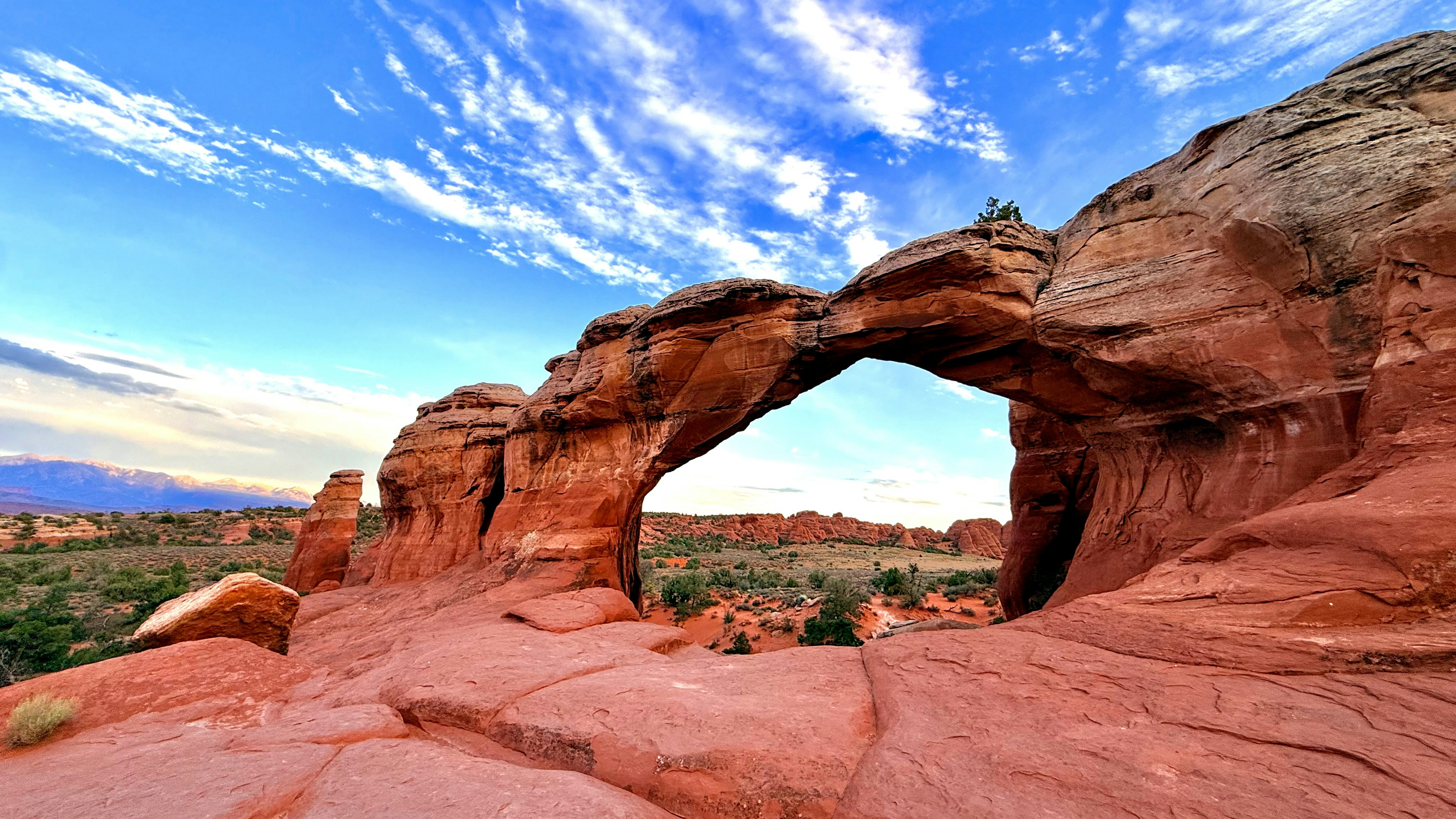 Desert Arch Framing: Sunrise over the Red Rock Ring