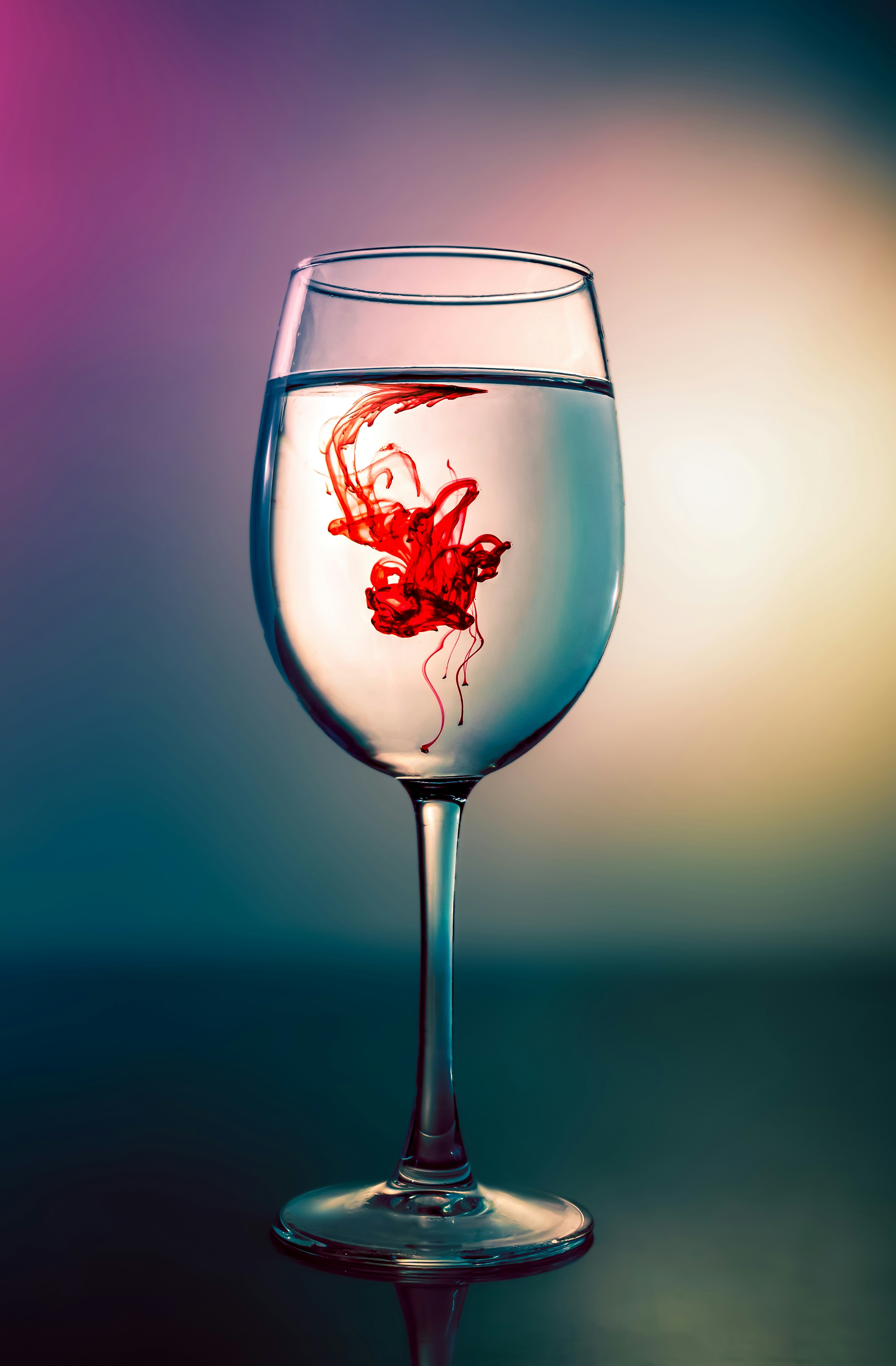 Crimson Ink in a Glass: A Glass of Color and Light