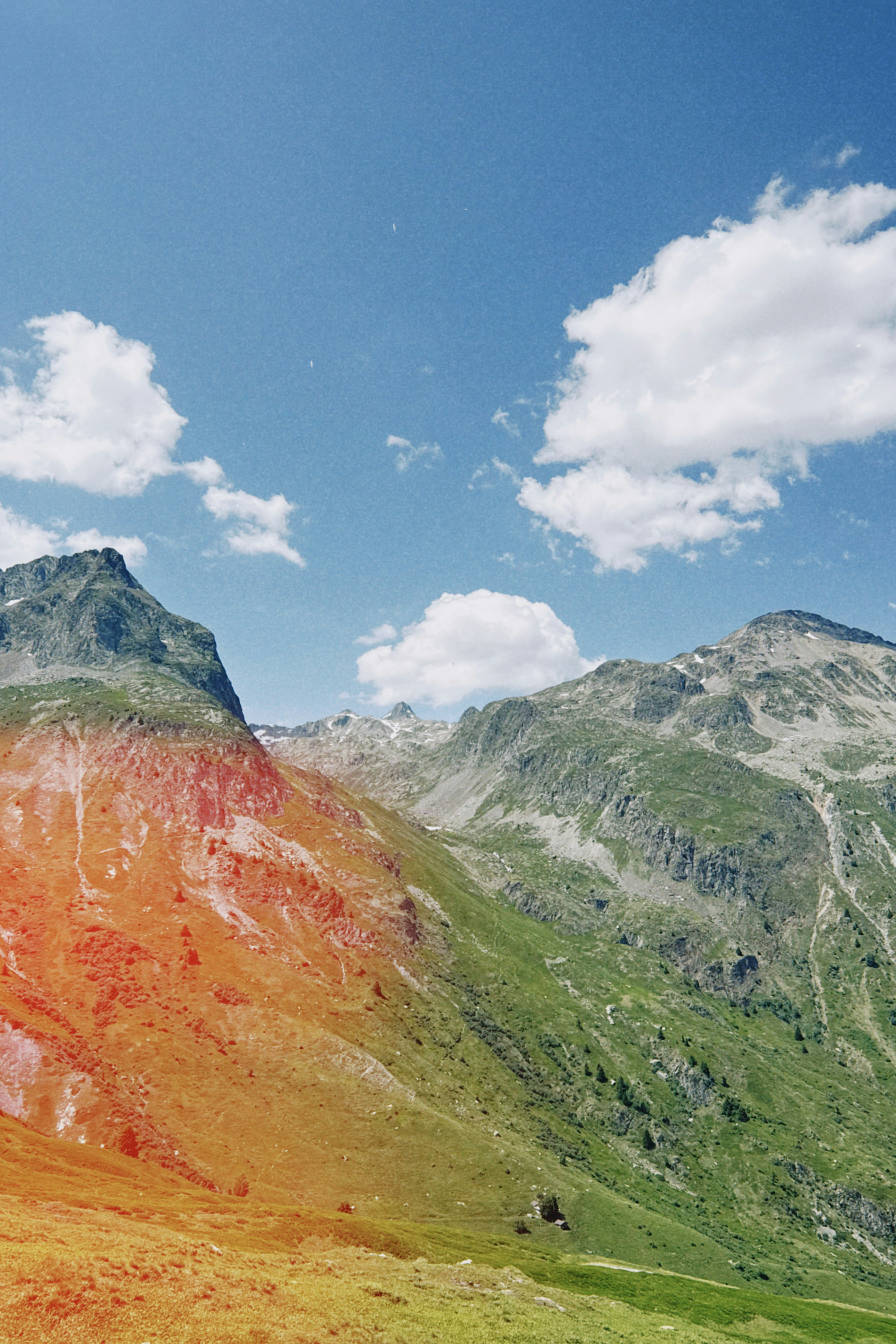 Sunlit Ridge: A Mountainscape Under a Clear Sky