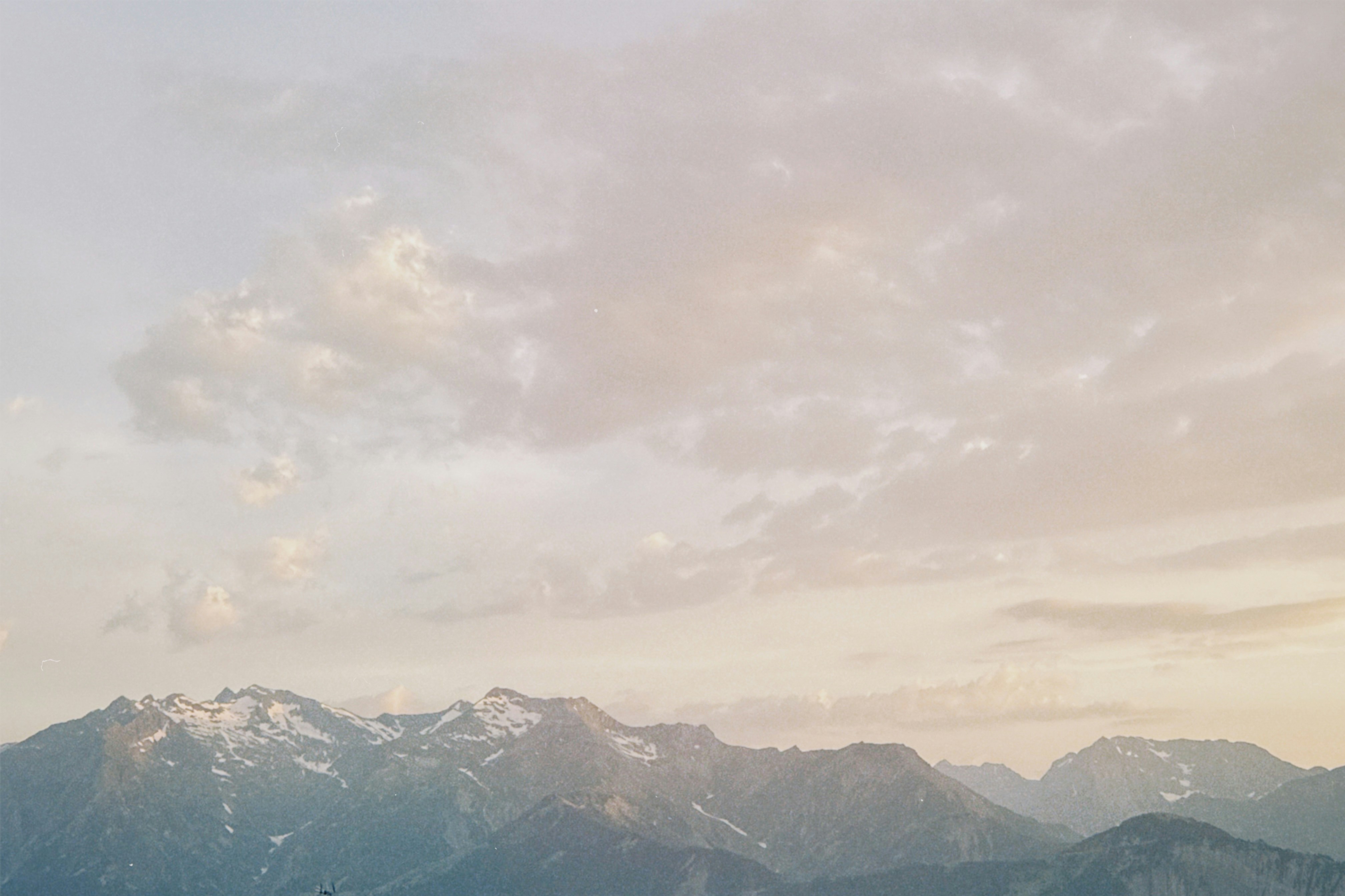 Distant Peaks Under a Quiet Sky
