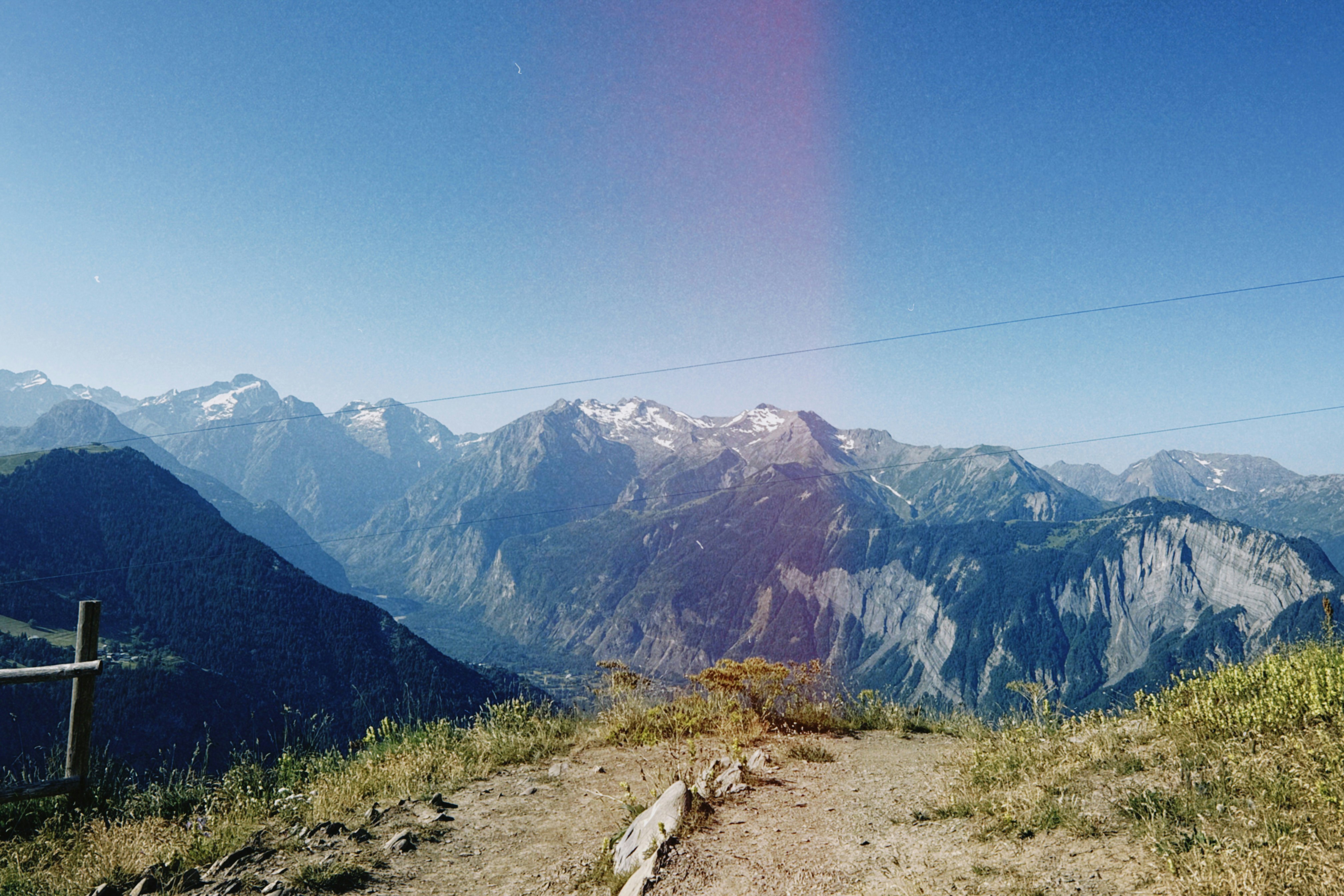 A Ribbon of Sky Over Alpine Ridges