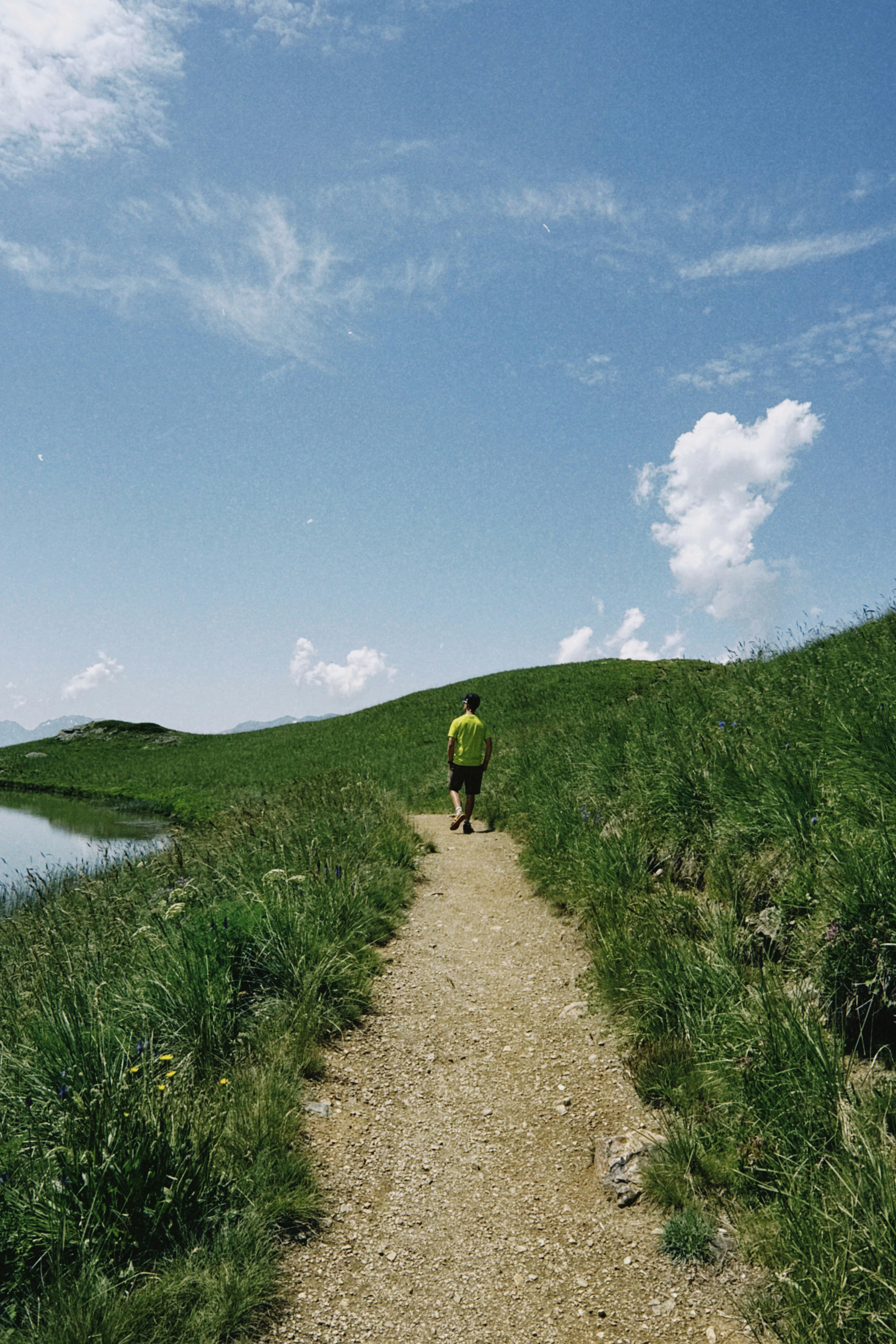 Lone Runner on a Sunlit Crest