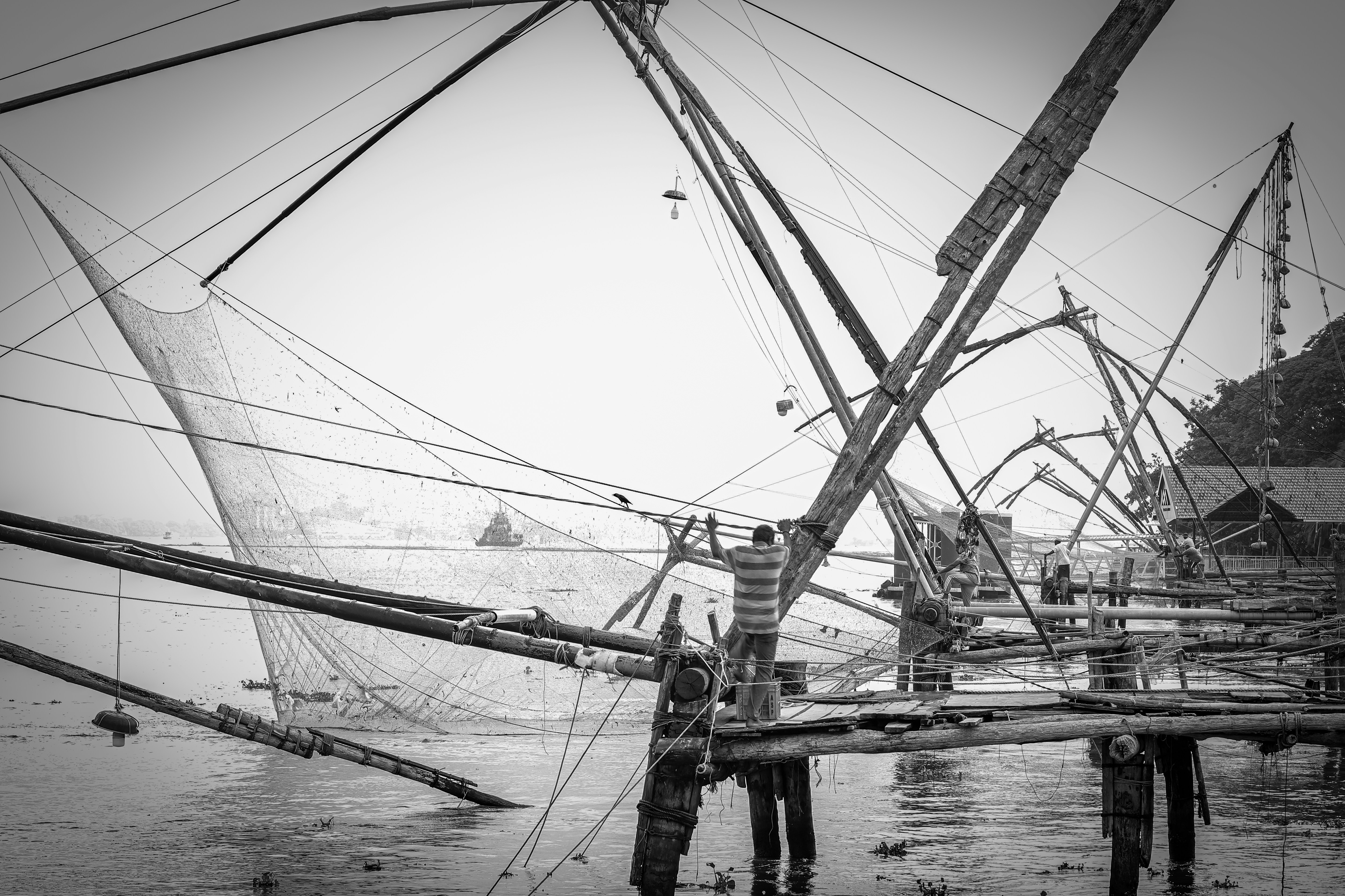 Sail Nets and Timber Skein: A Quiet Fleet at Dusk