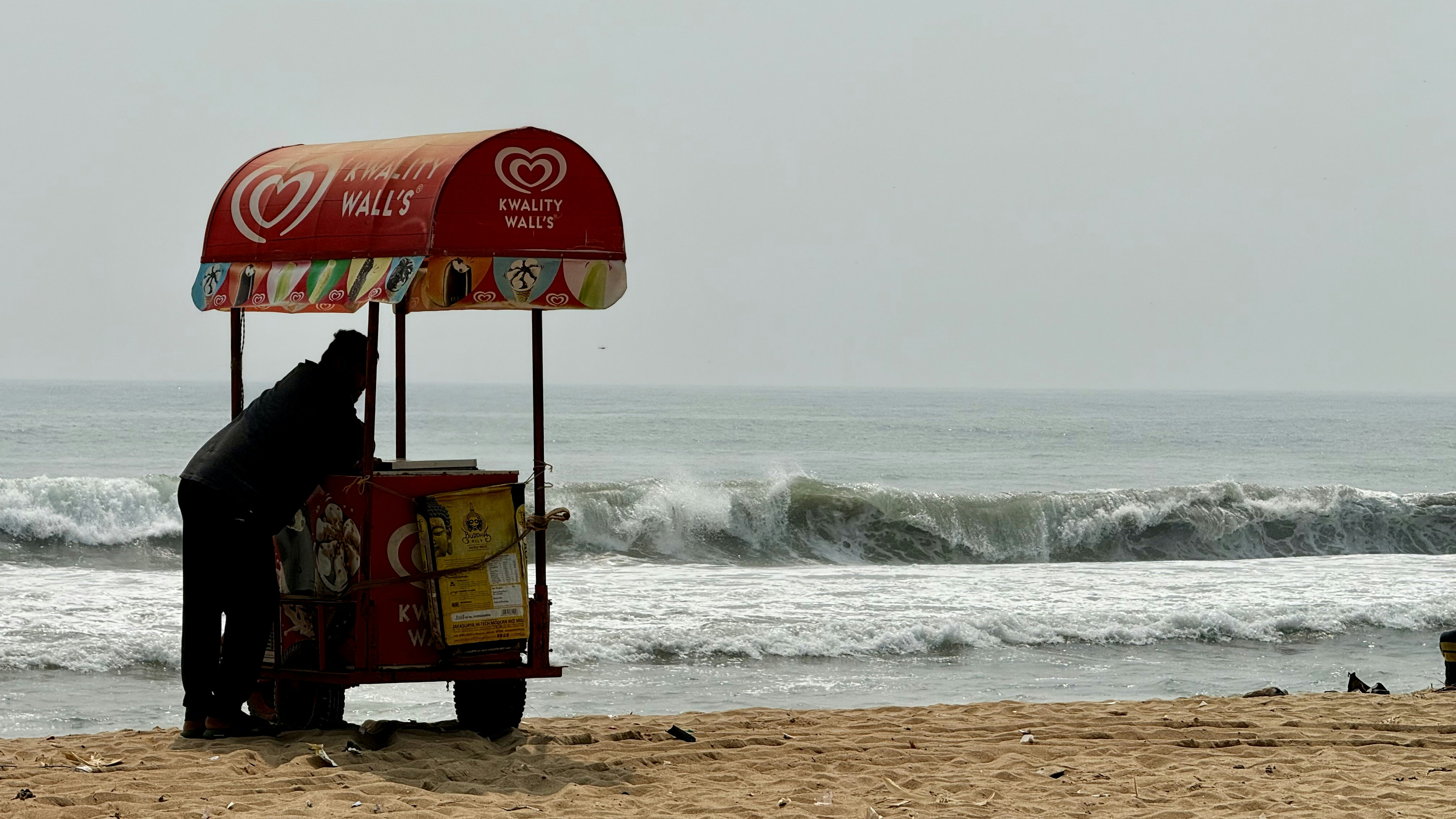 Ice Cream Cart at Dusk: Shoreline Silhouette