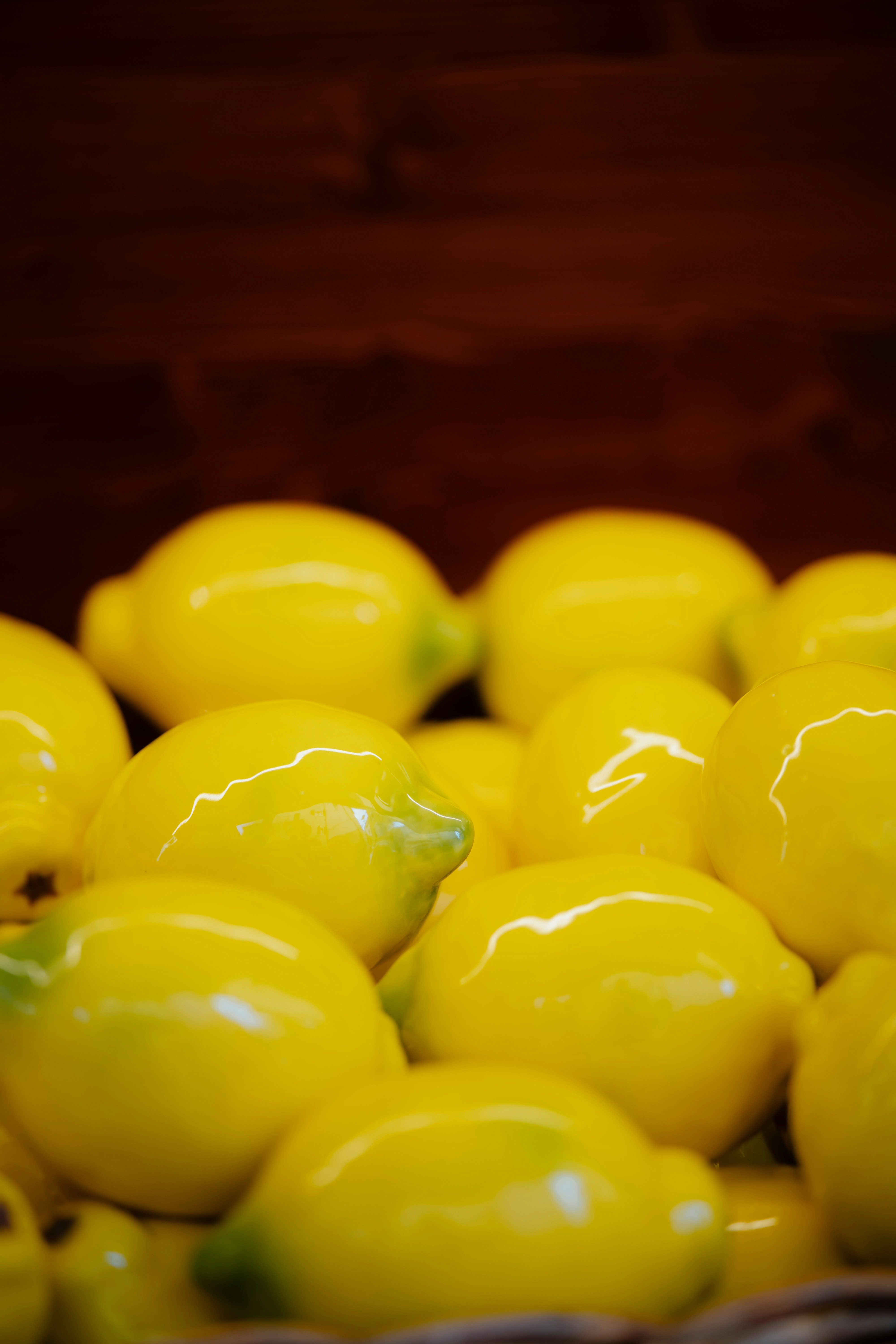 Lemon Glow: Close-Up of Bright Yellow Peppers in Soft Lighting