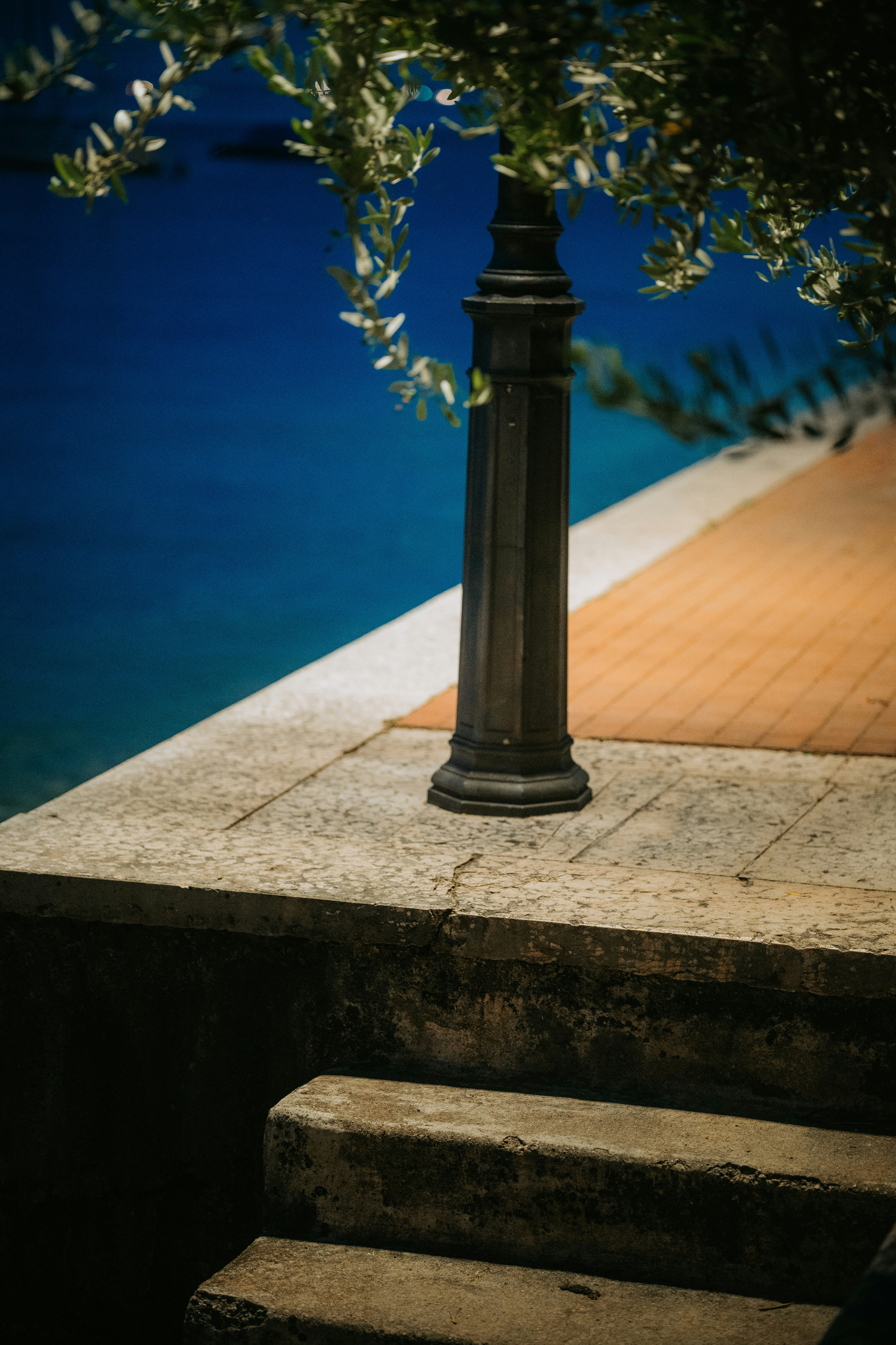 Pole at the Waterside Edge