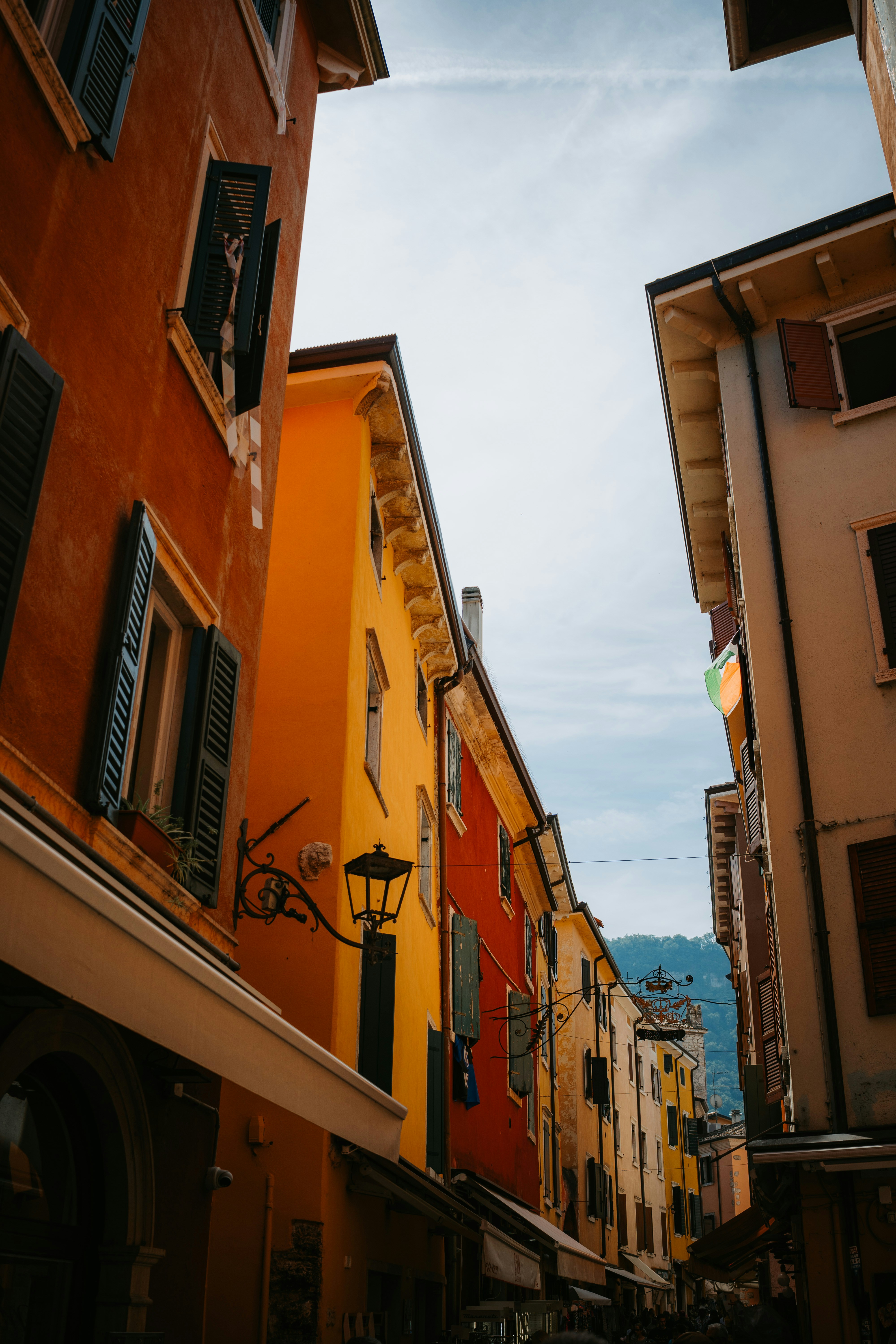 Sunlit Alley of Colorful Facades