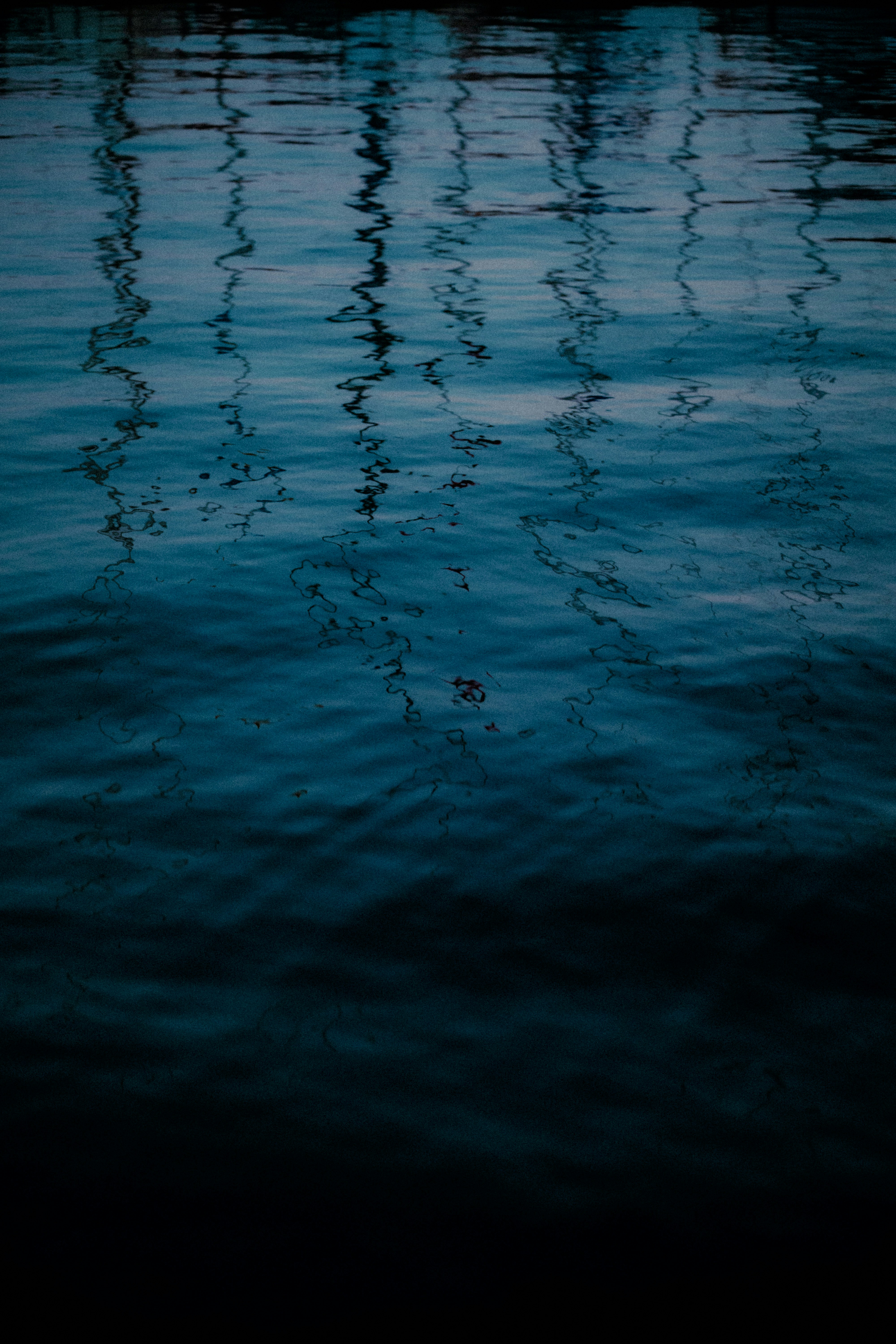 Reflections on Quiet Blue Surface