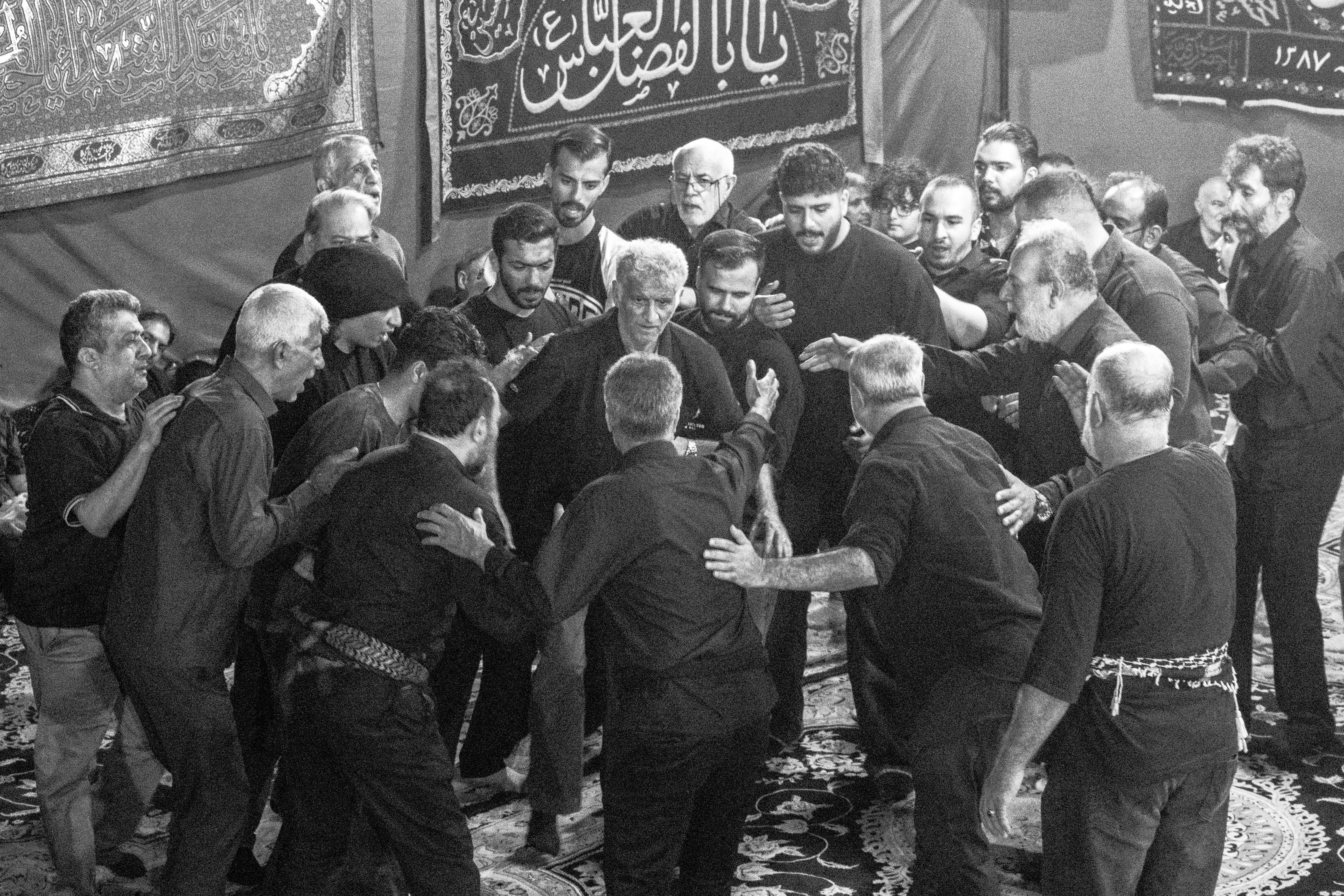 Circle of Resolve: Men Unite in a Shared Moment