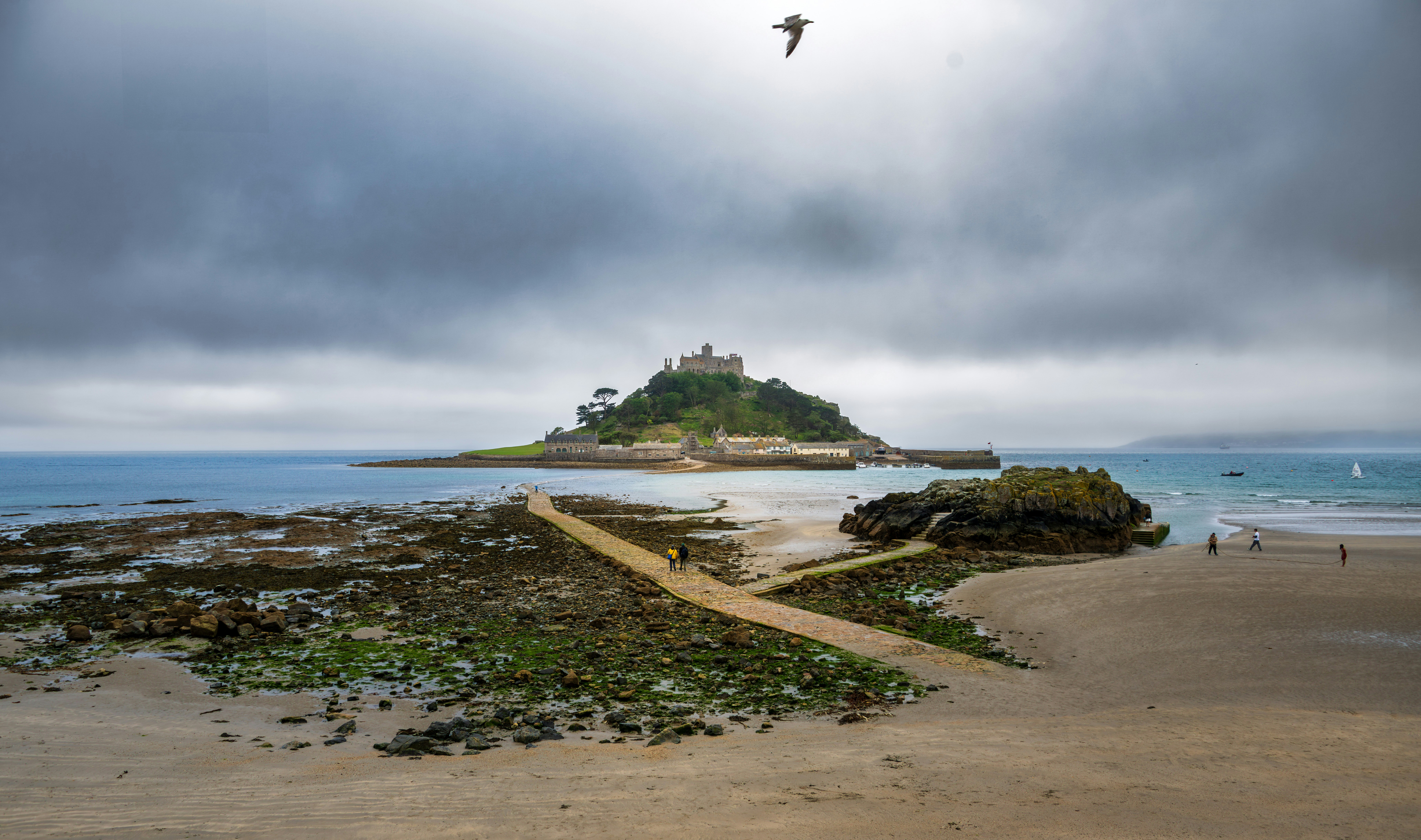 Path to the Island: A Charlottenberger Ridge Under Gray Skies