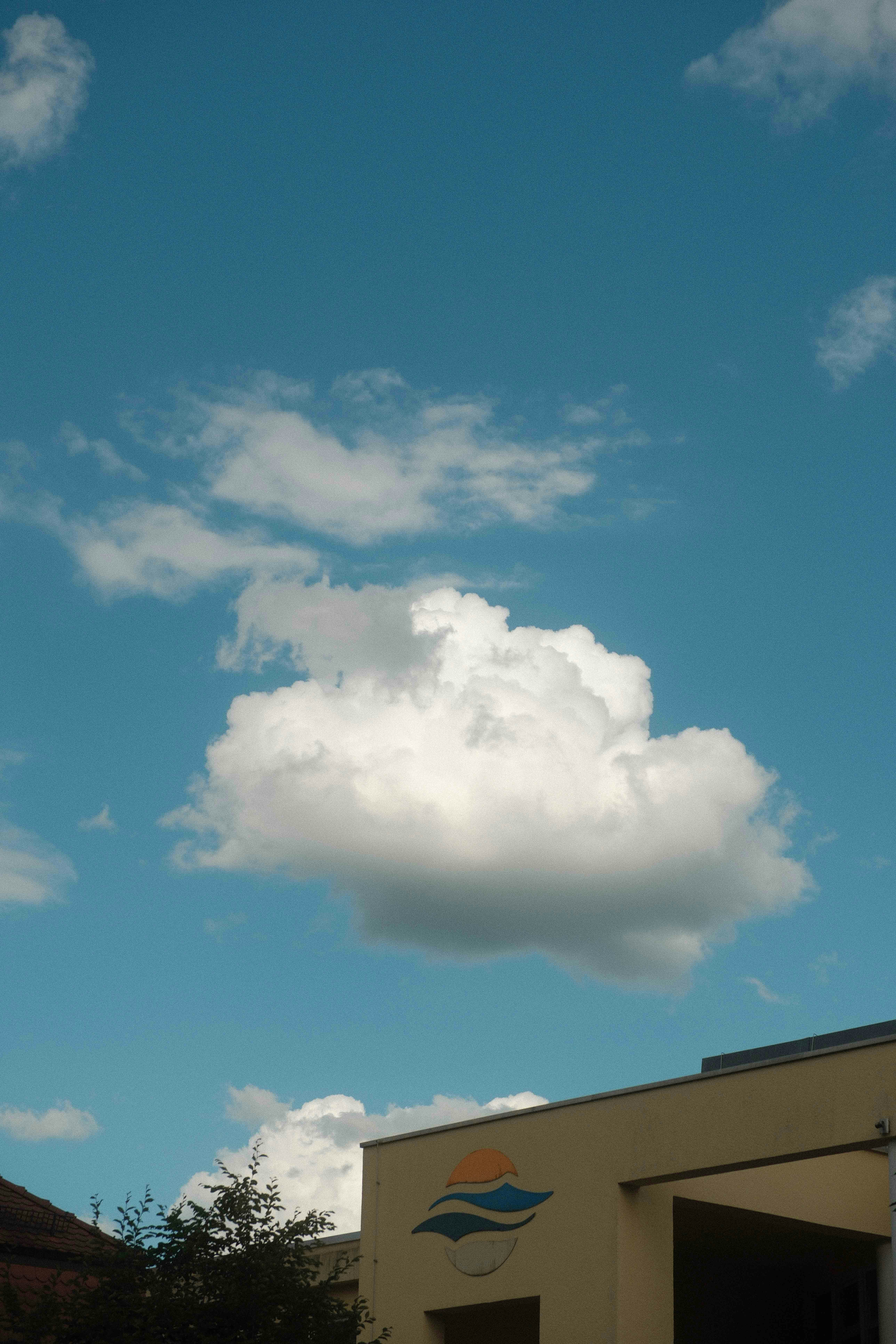 Cloud Crown over a Low Building