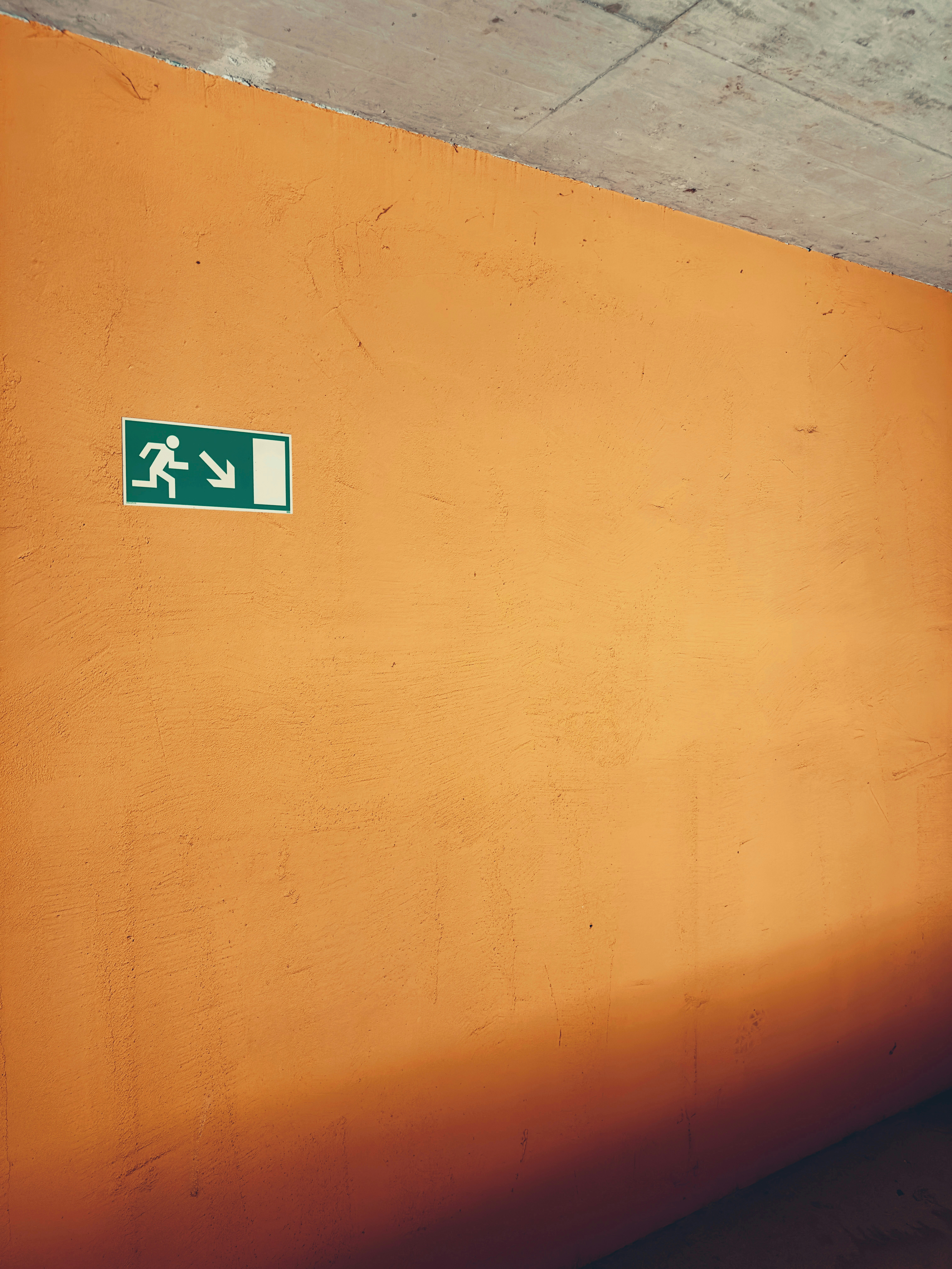 Exit Route Painted on Warm Orange Wall