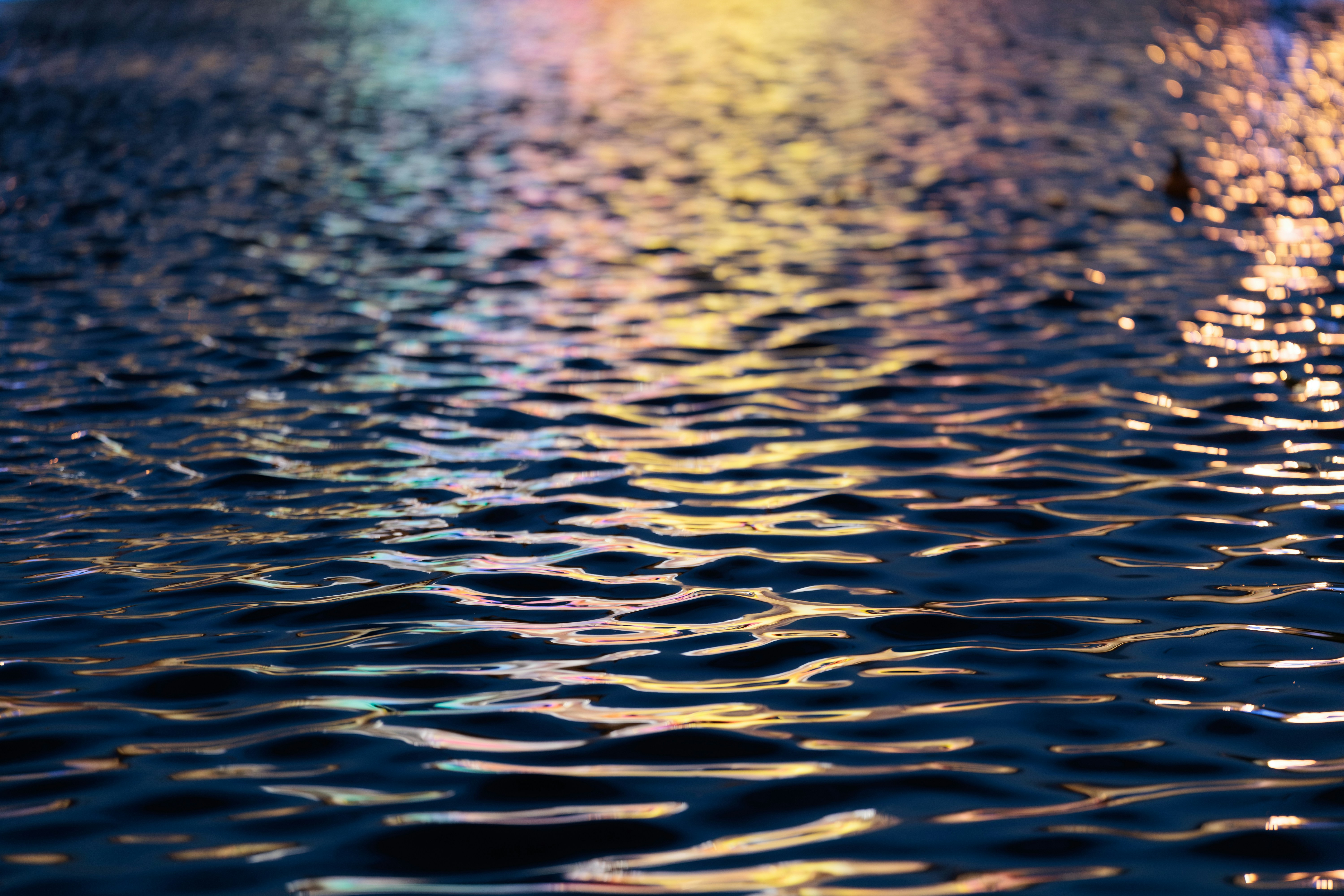 Silent Ripples of Evening Light on City Water