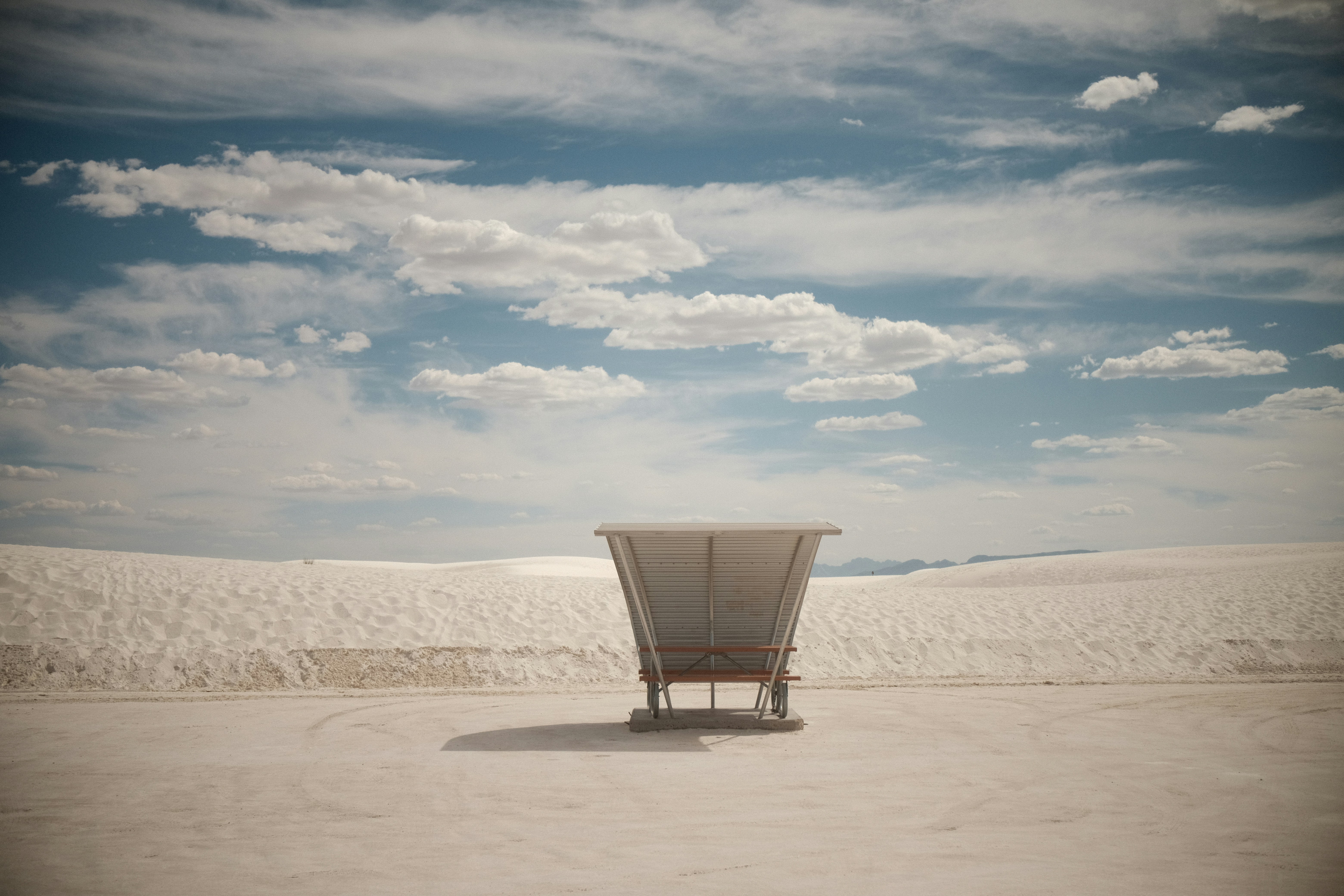 Solitary Beach Chair Guarded by a Quiet Horizon