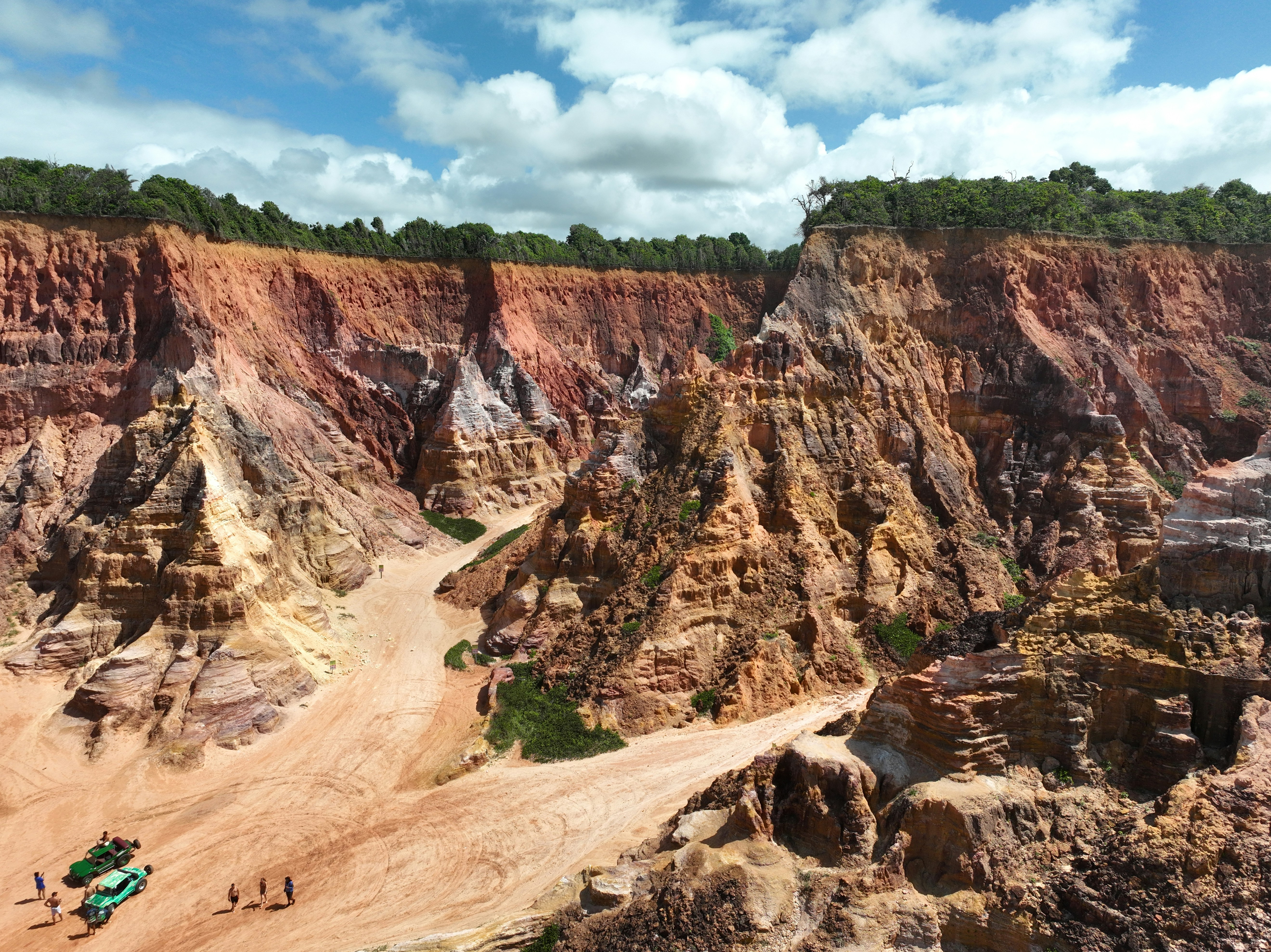 Rugged Canyon Carvings: A Sunlit Gap Between Strata