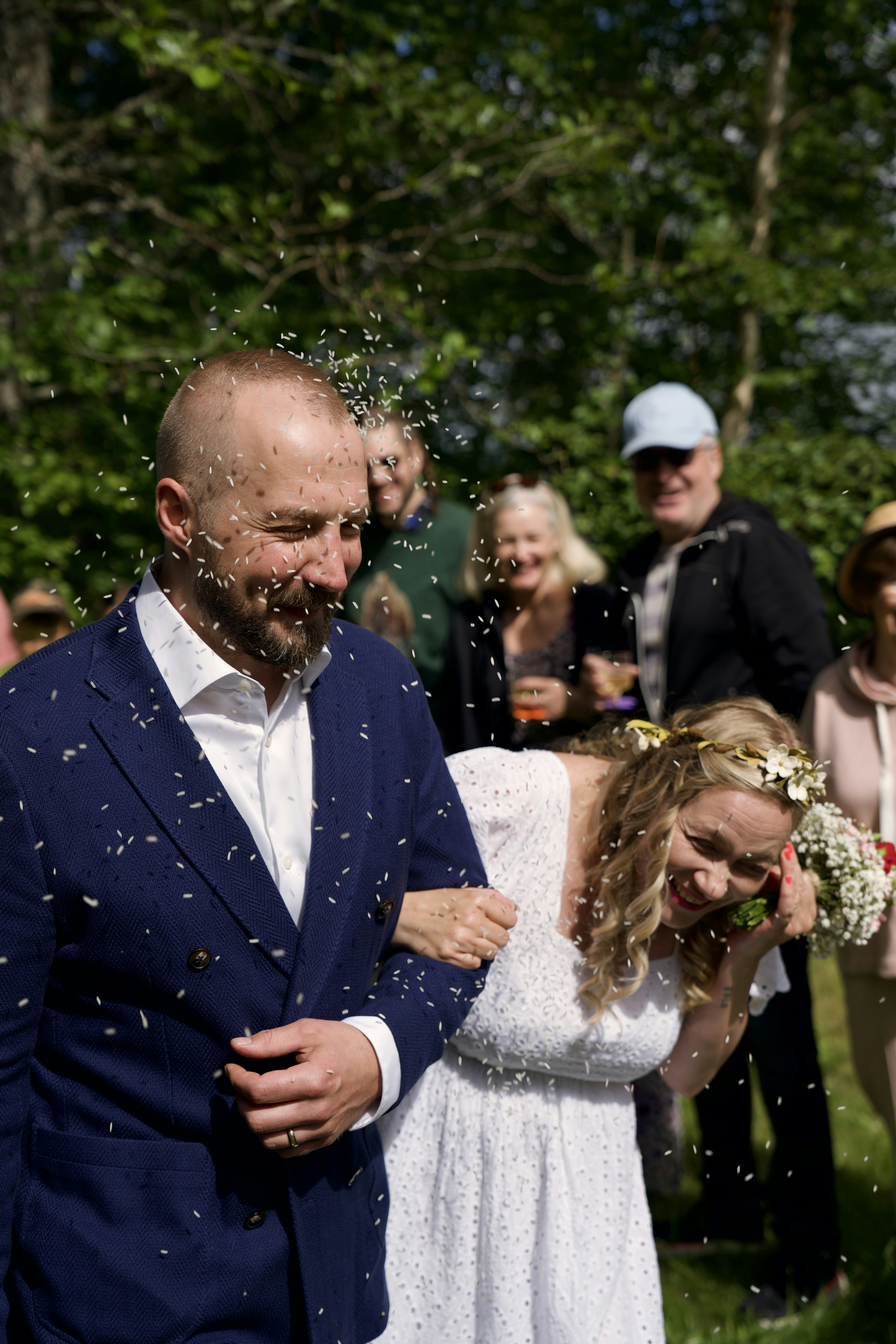 Confetti of Joy: A Wedding Moment of Laughter and Blur