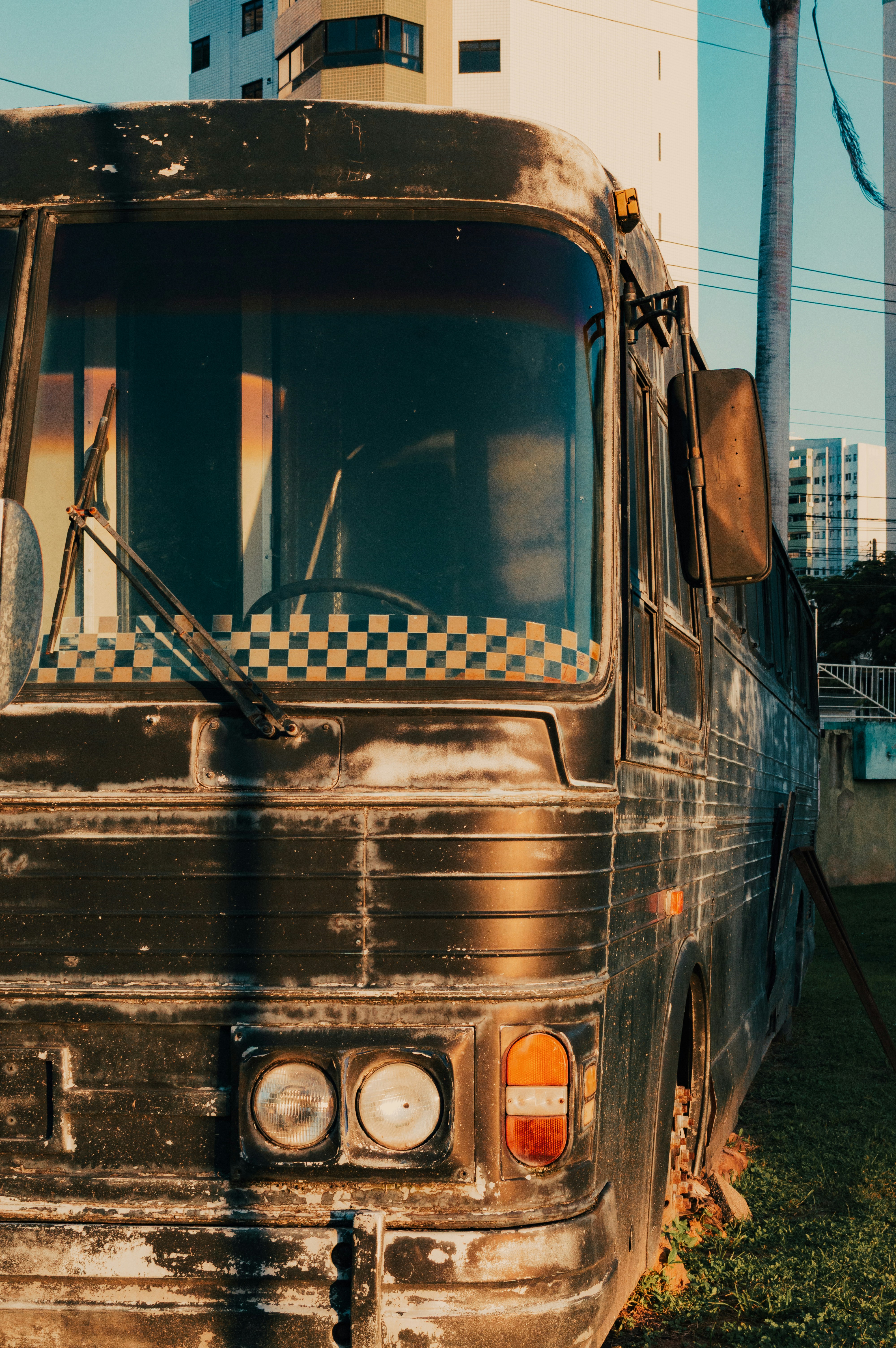 Dusty Bus, Sunlit Urban Echoes