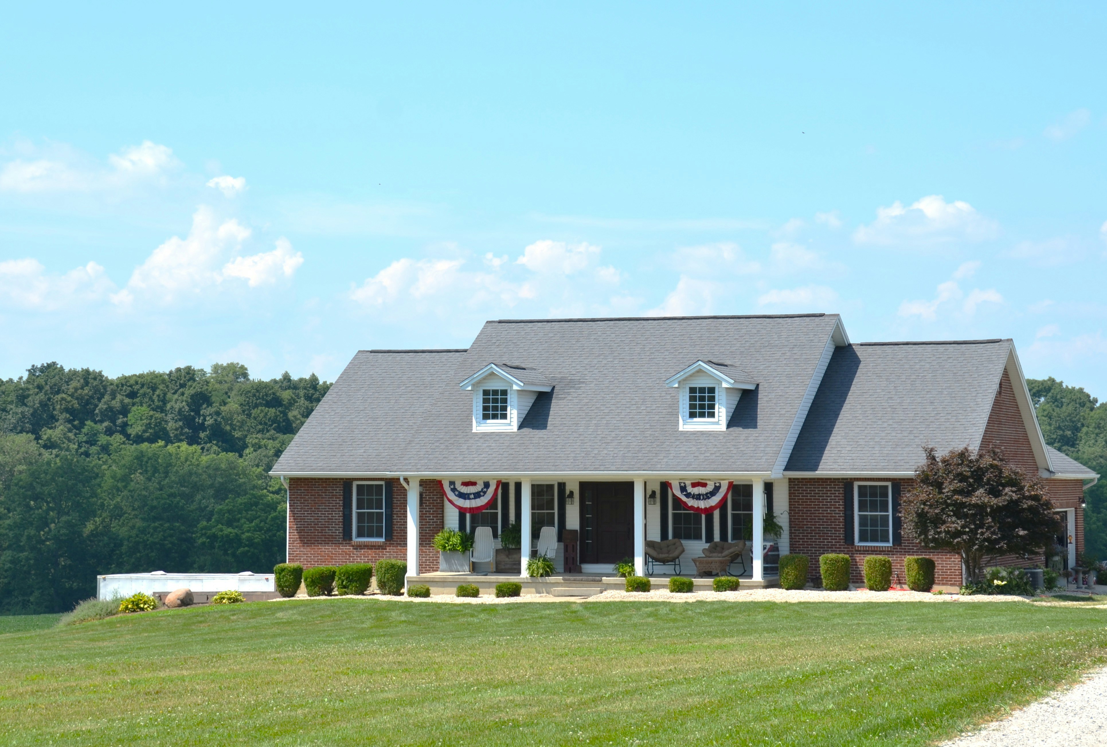 Country House on a Gentle Slope with Patriotic Detailing