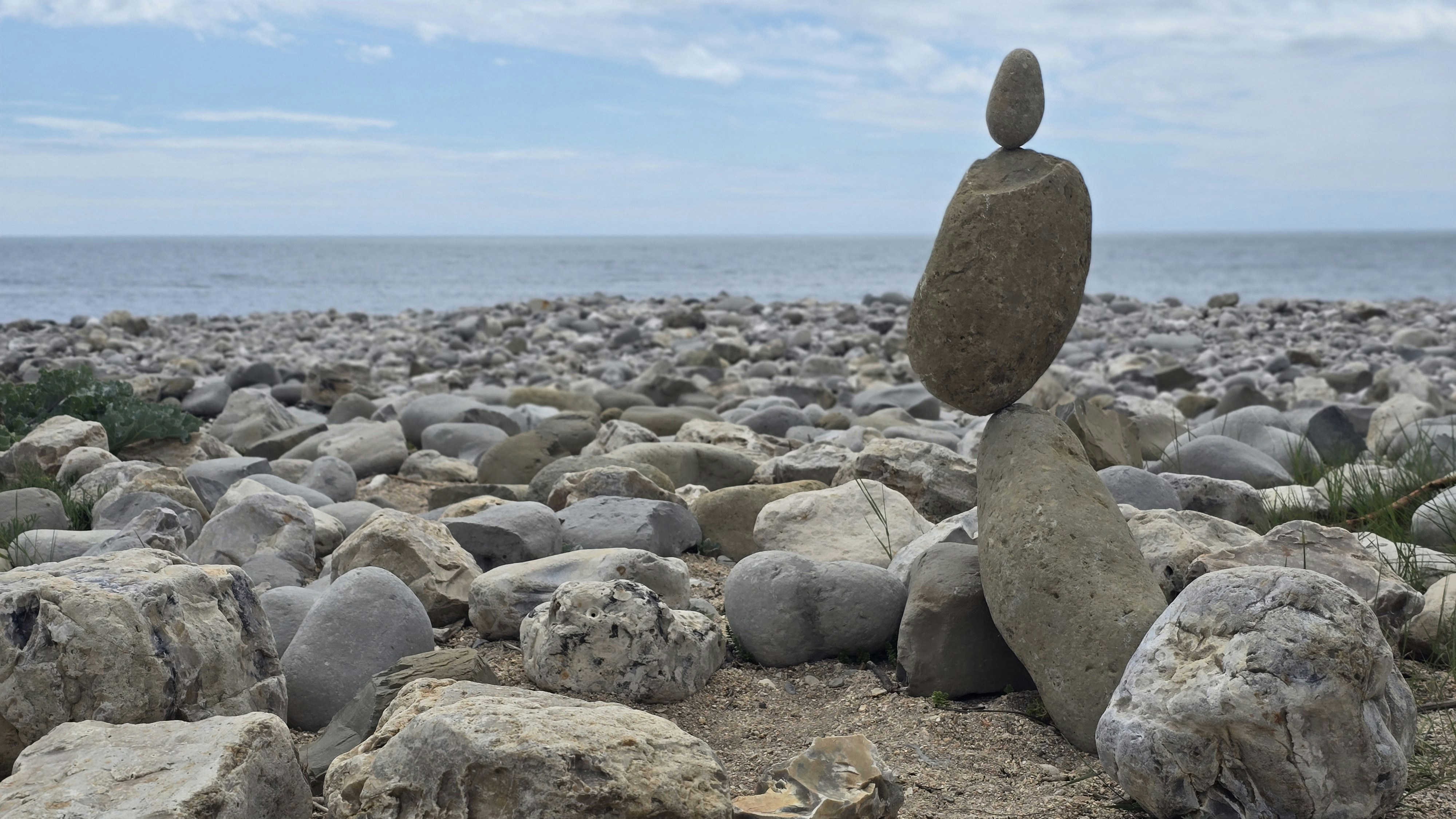Balanced Stones at the Shoreline