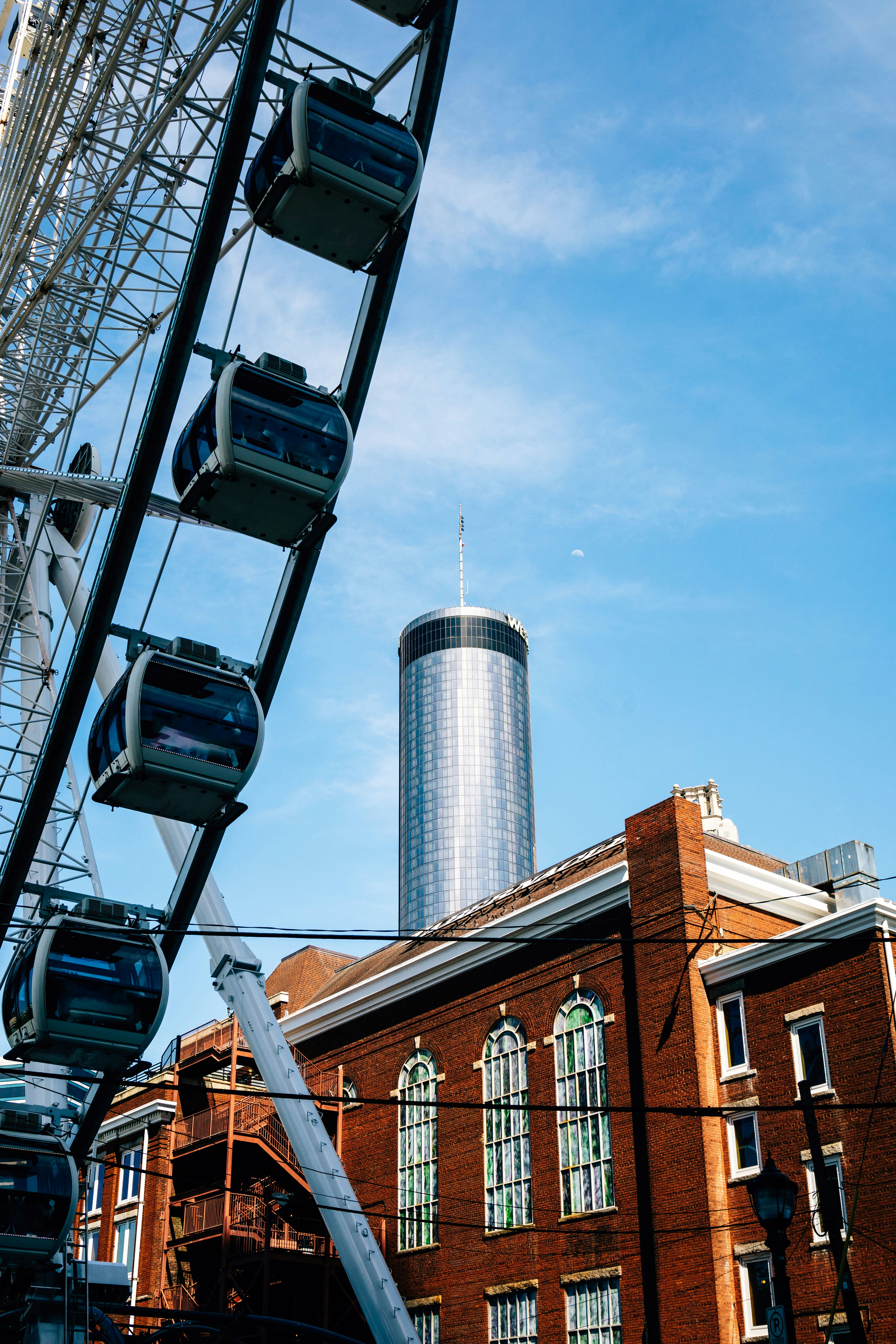 Skyward Gears: A Ferris Wheel Over Historic Facades