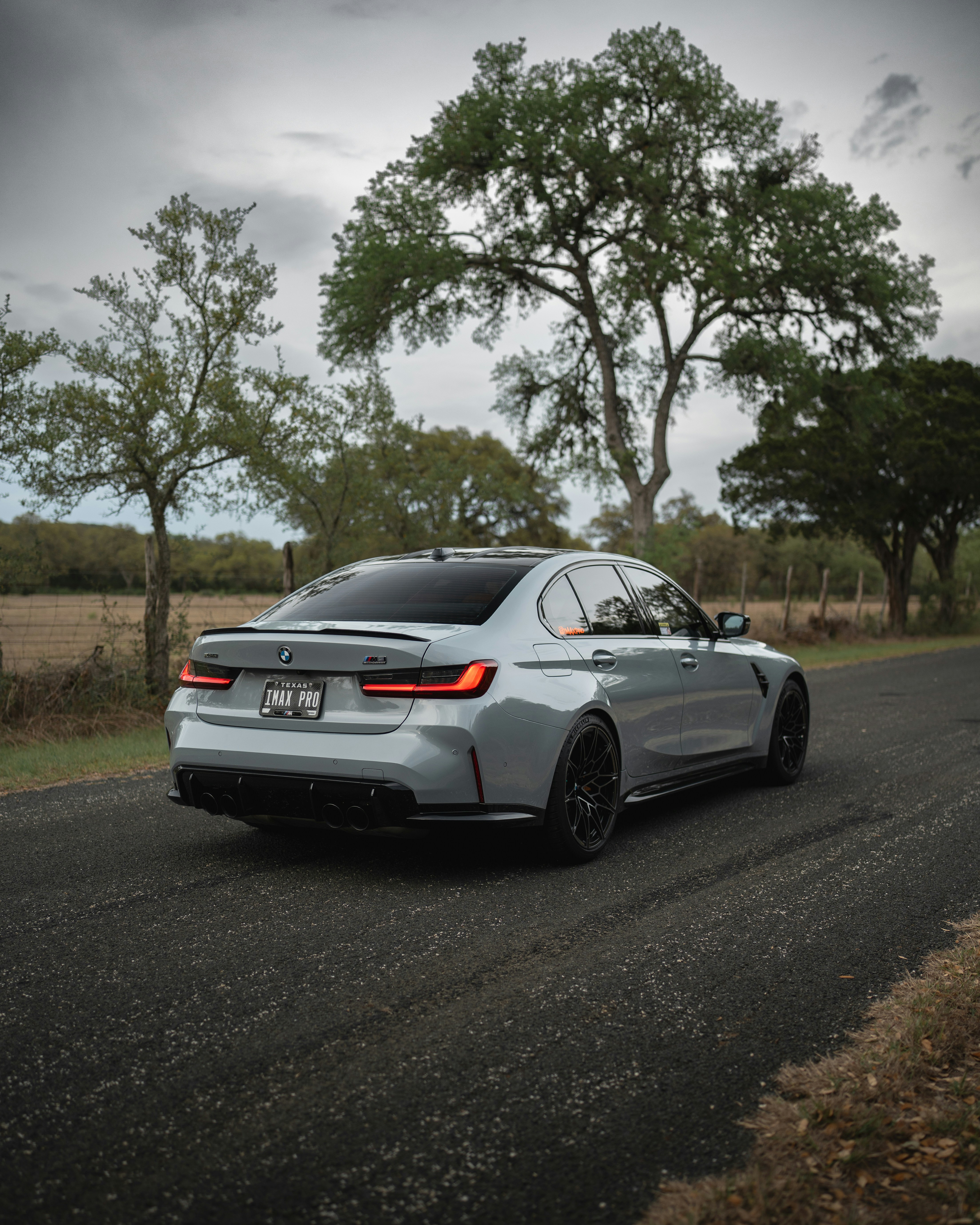 Rear-View Road Warrior: BMW M4 on a Quiet Country Lane
