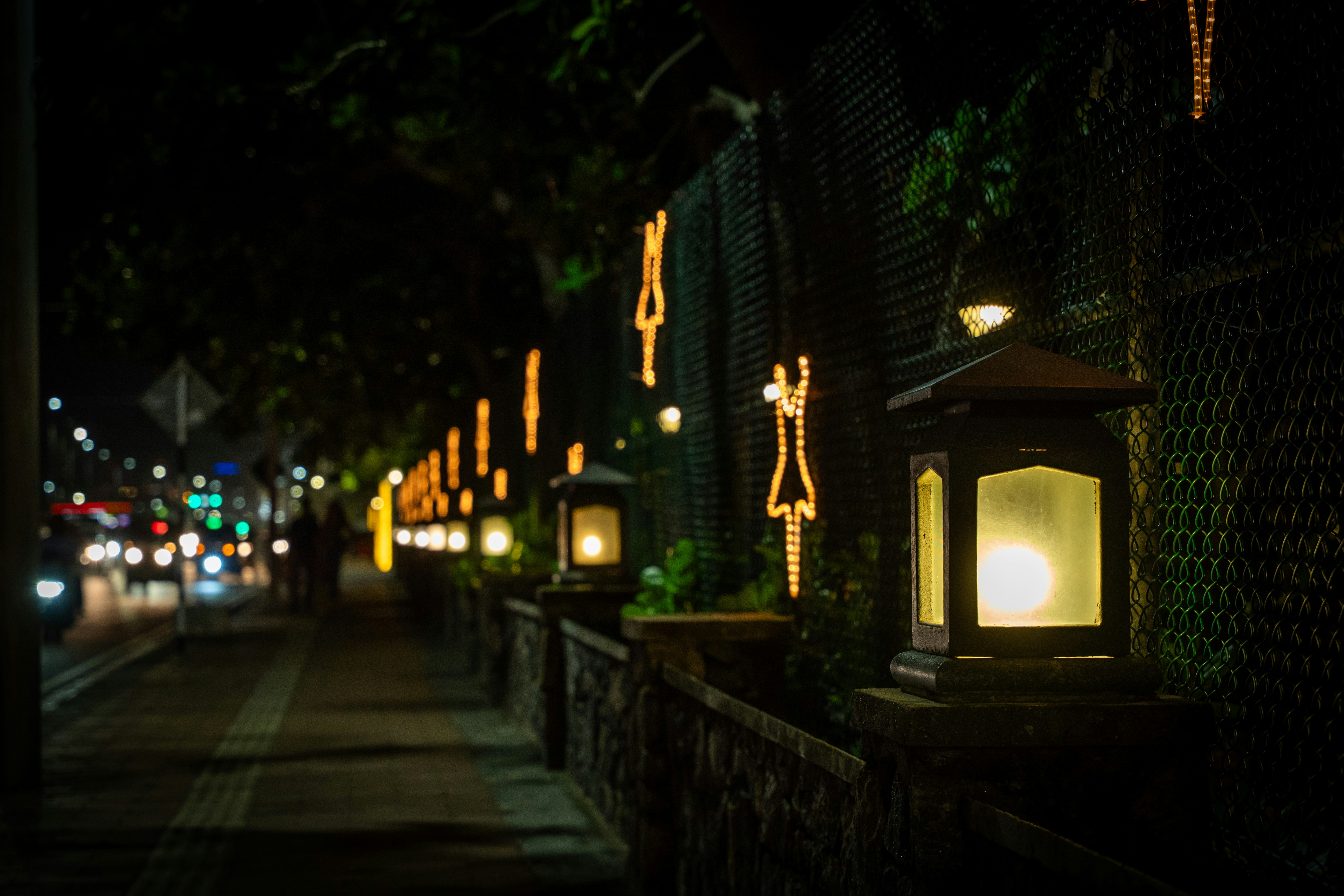 Lantern-lit Boulevard: Night Walk Beneath Quiet Street Lamps