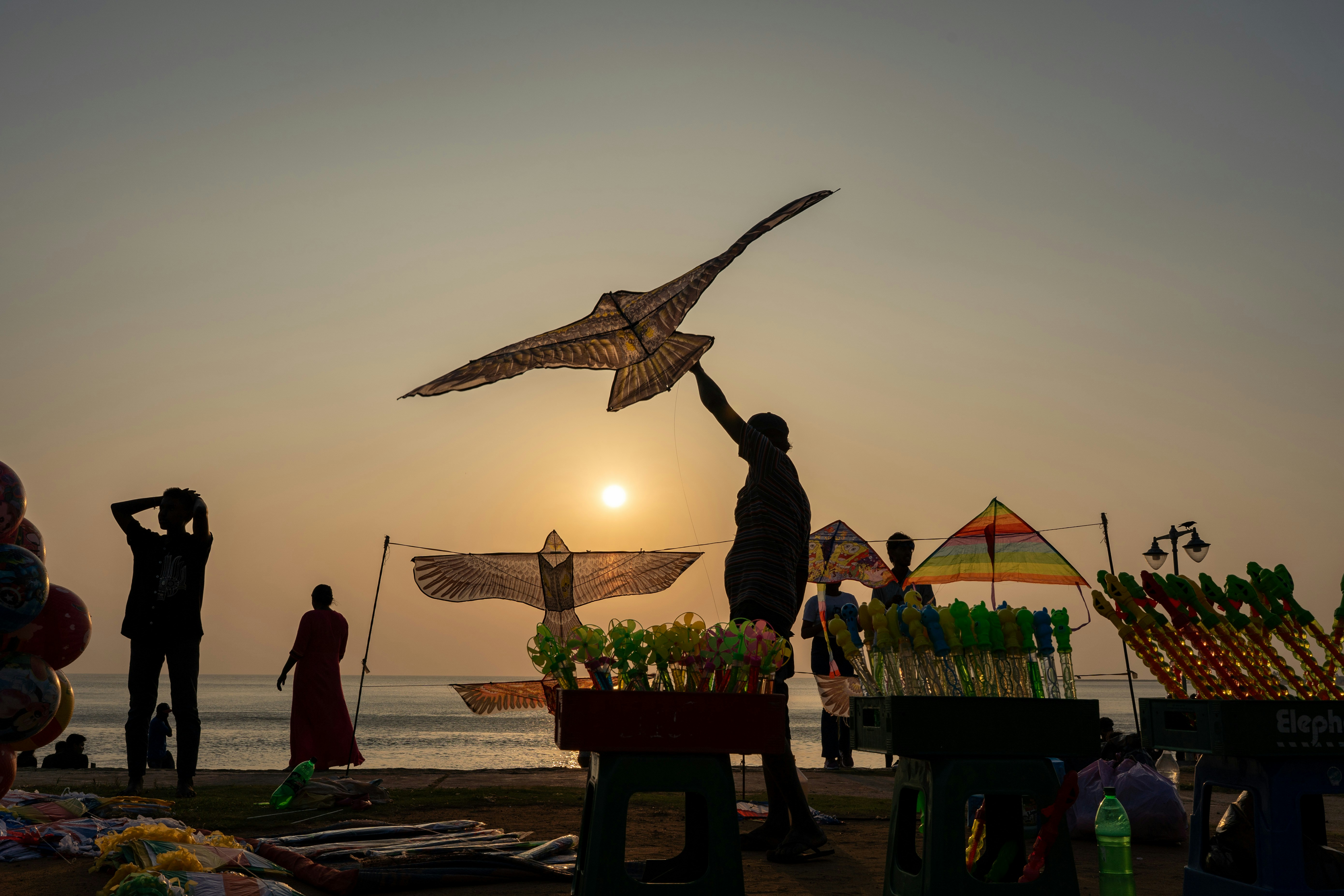 Sunset Kite Seller at the Quiet Shore